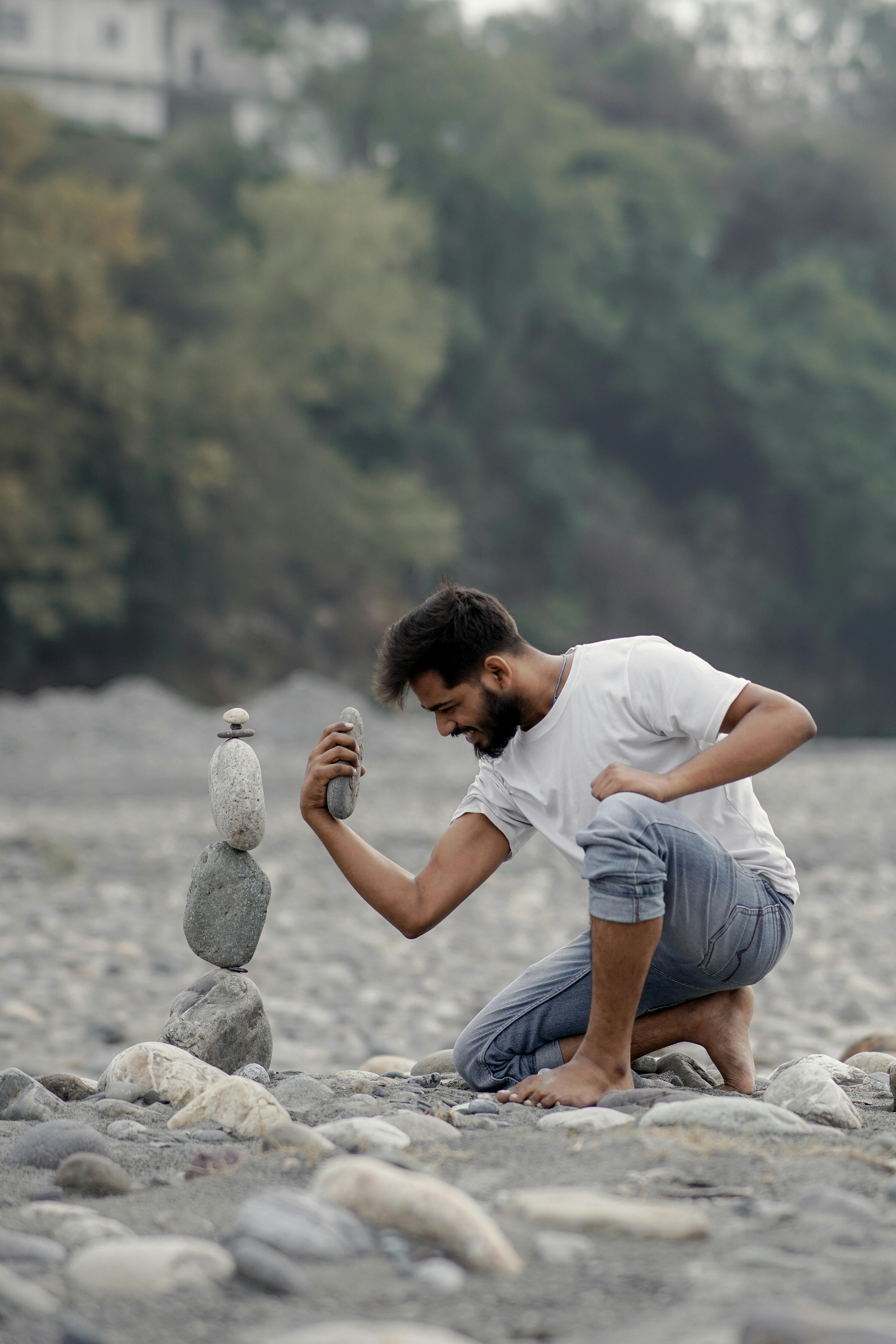 Man Rocks Art Balancing Photos, Download The BEST Free Man Rocks Art Balancing Stock Photos & HD ...