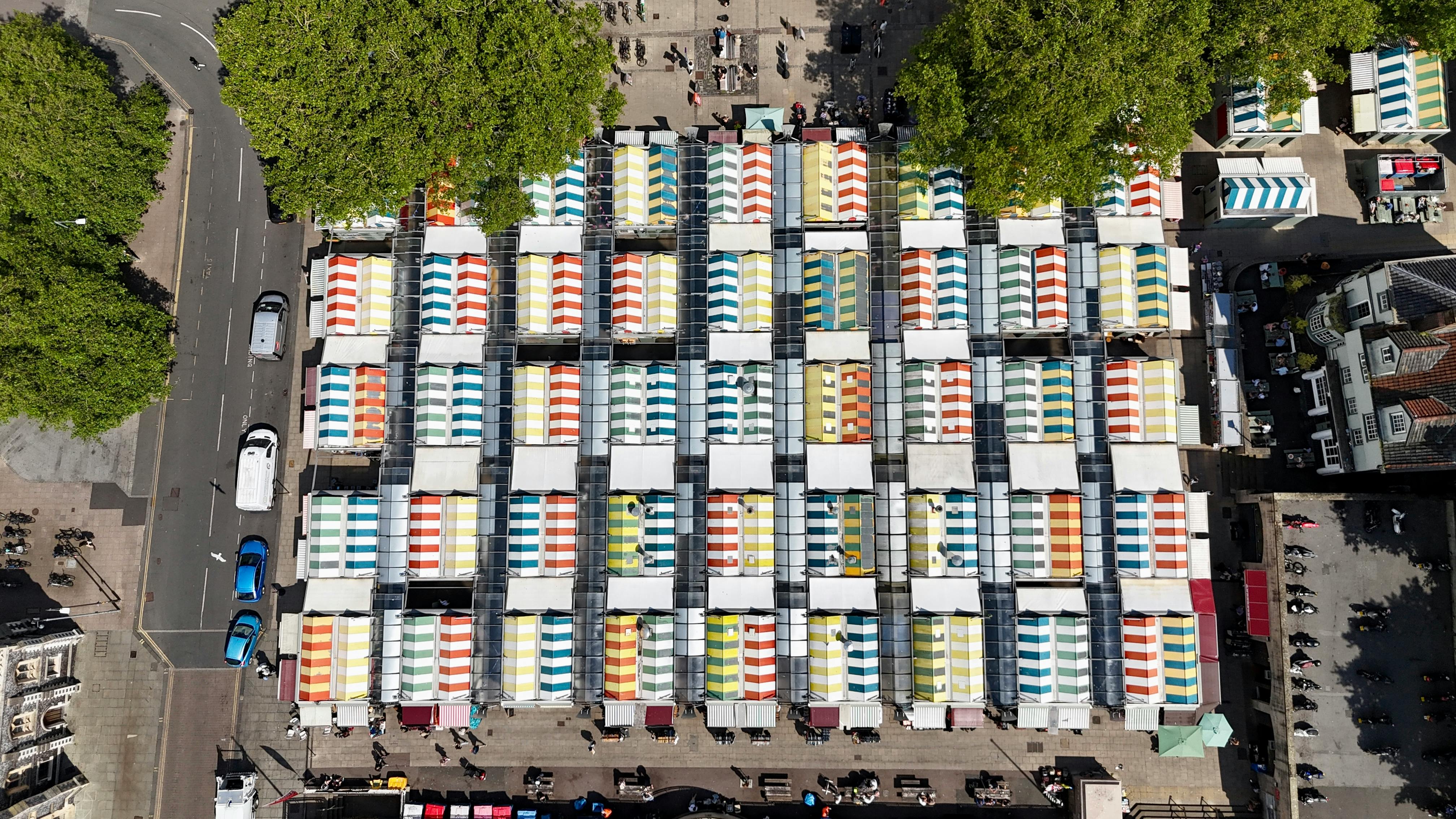 Birds Eye View of a Market with Colorful Roofs over the Stalls · Free ...