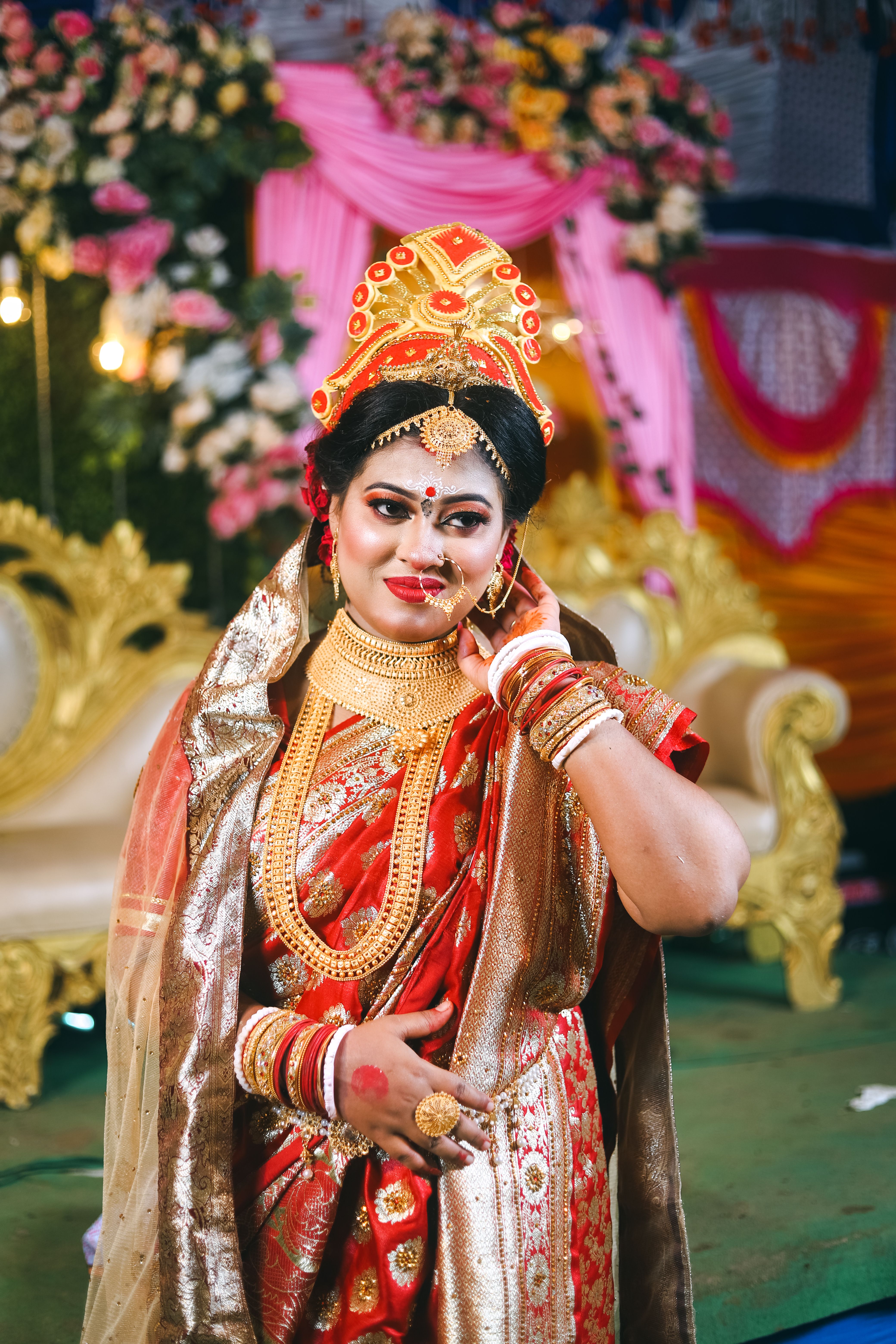 A woman in traditional indian attire posing for the camera · Free Stock ...