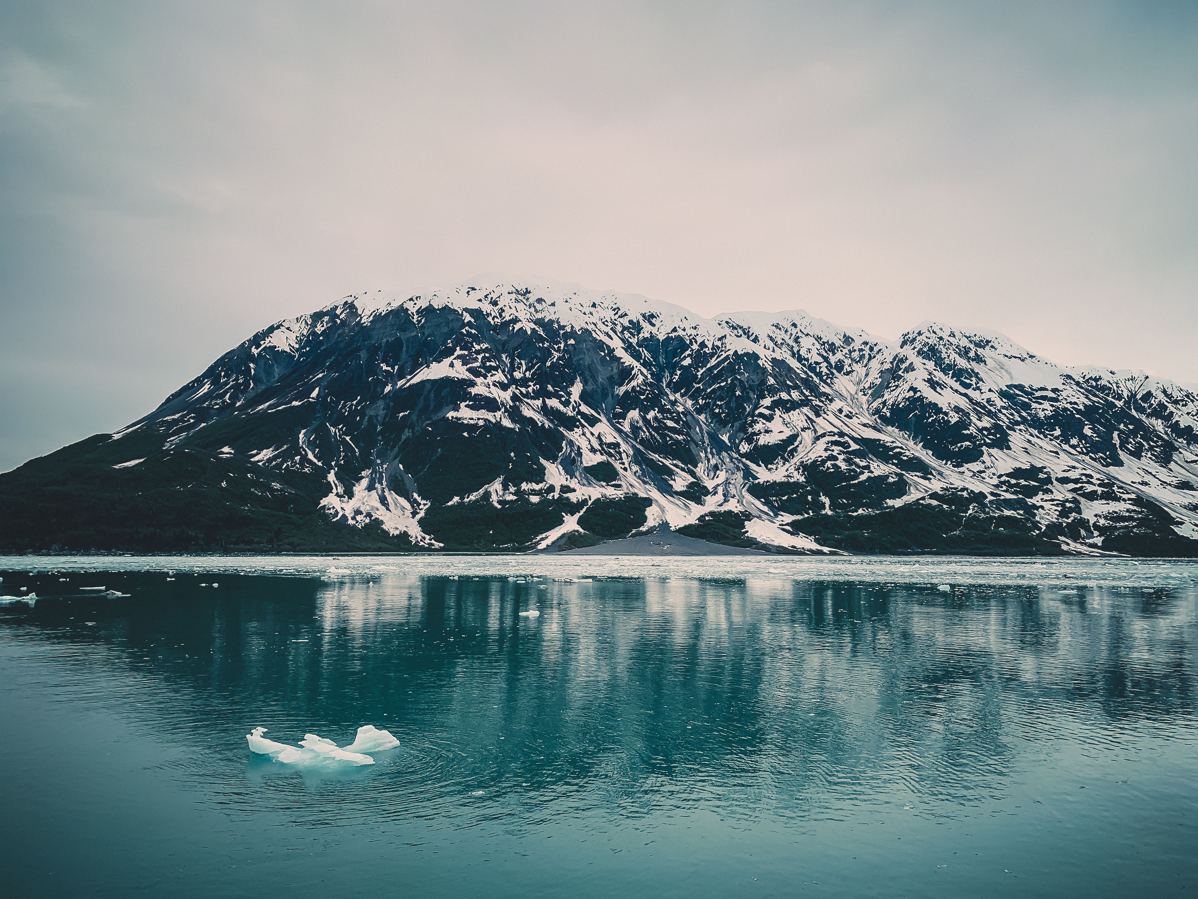 Snowcapped Mountain by Cold Lake in Alaska, USA · Free Stock Photo