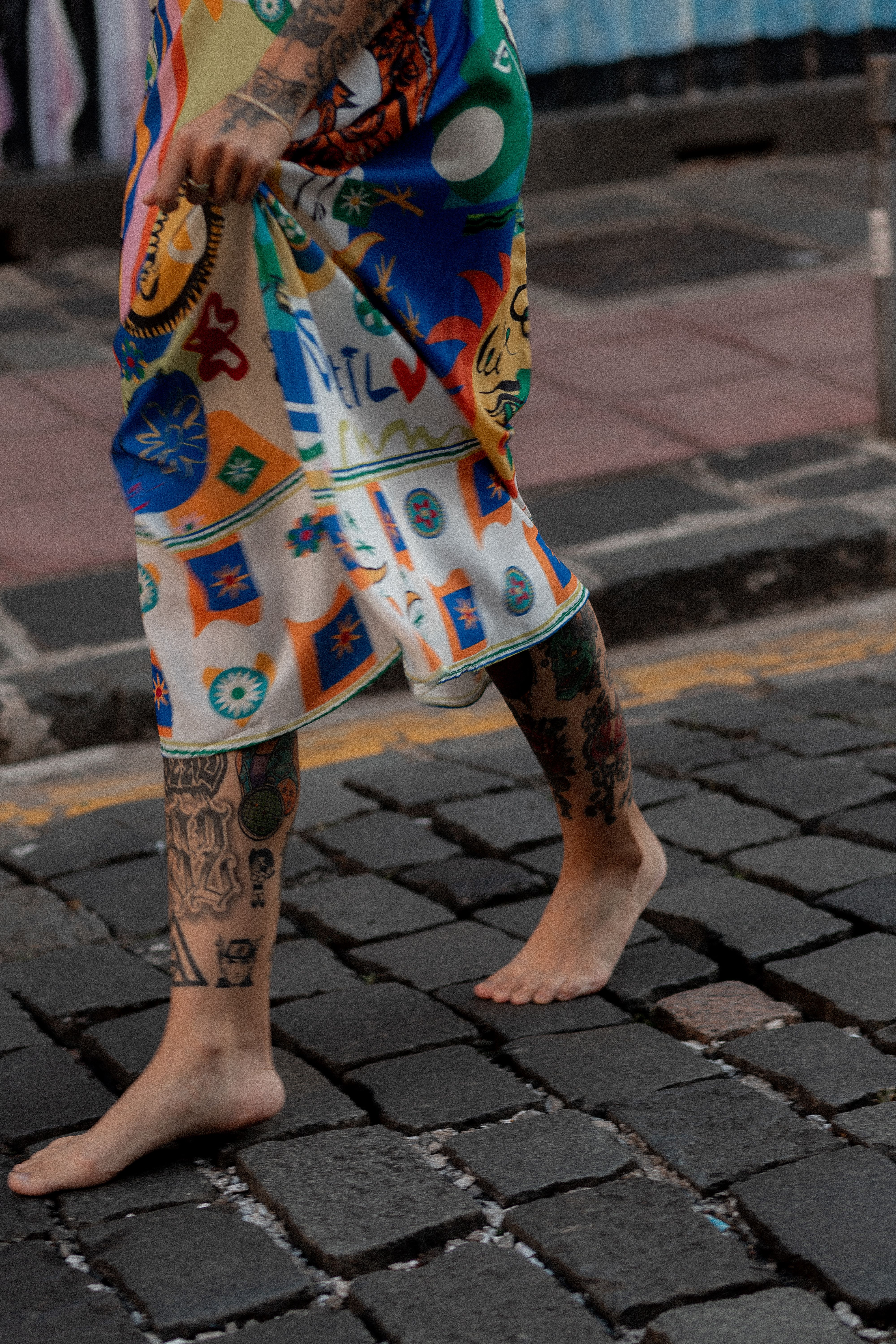 Barefoot Woman Walking Paving Stone · Free Stock Photo