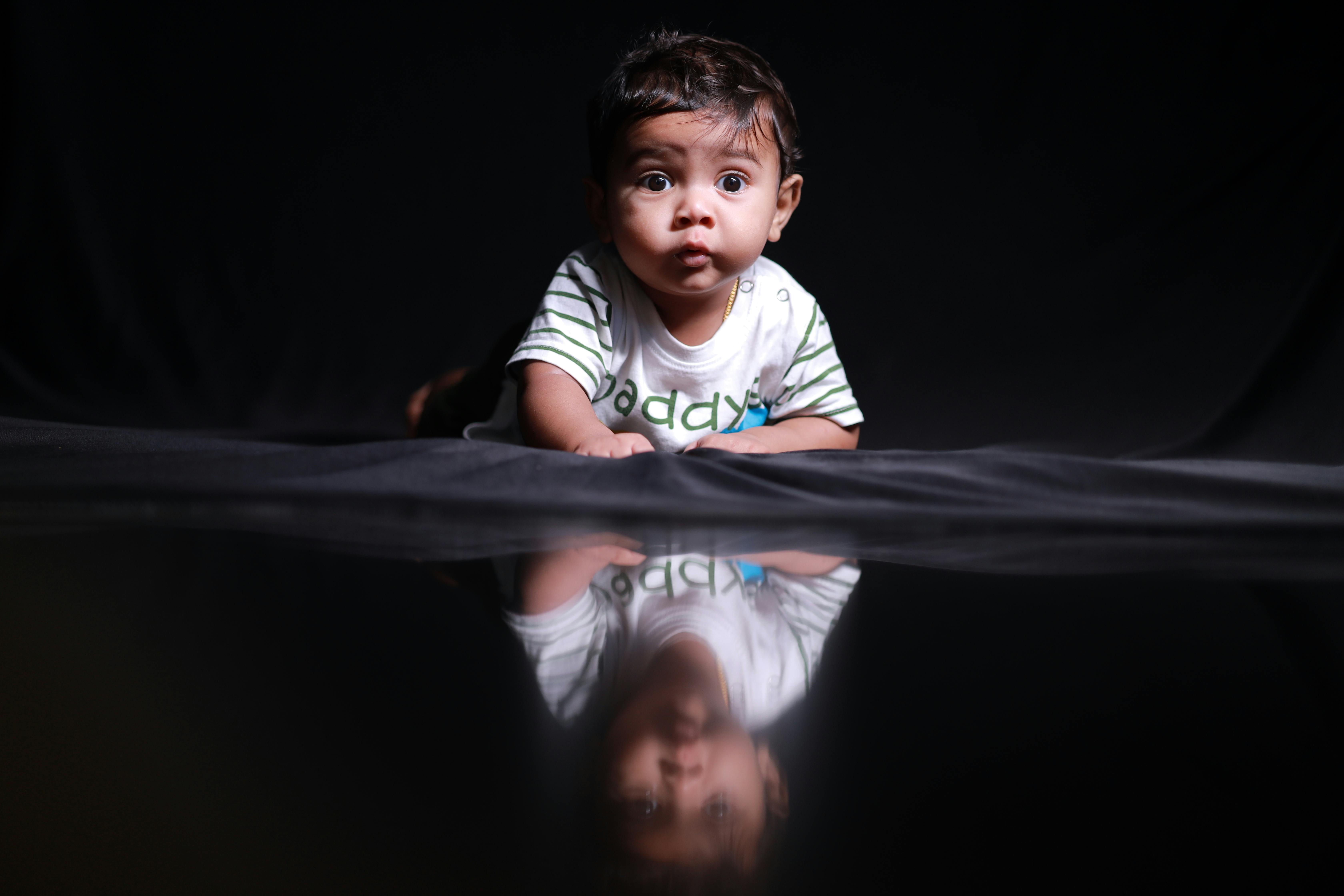 Little Boy and His Reflection in Studio · Free Stock Photo