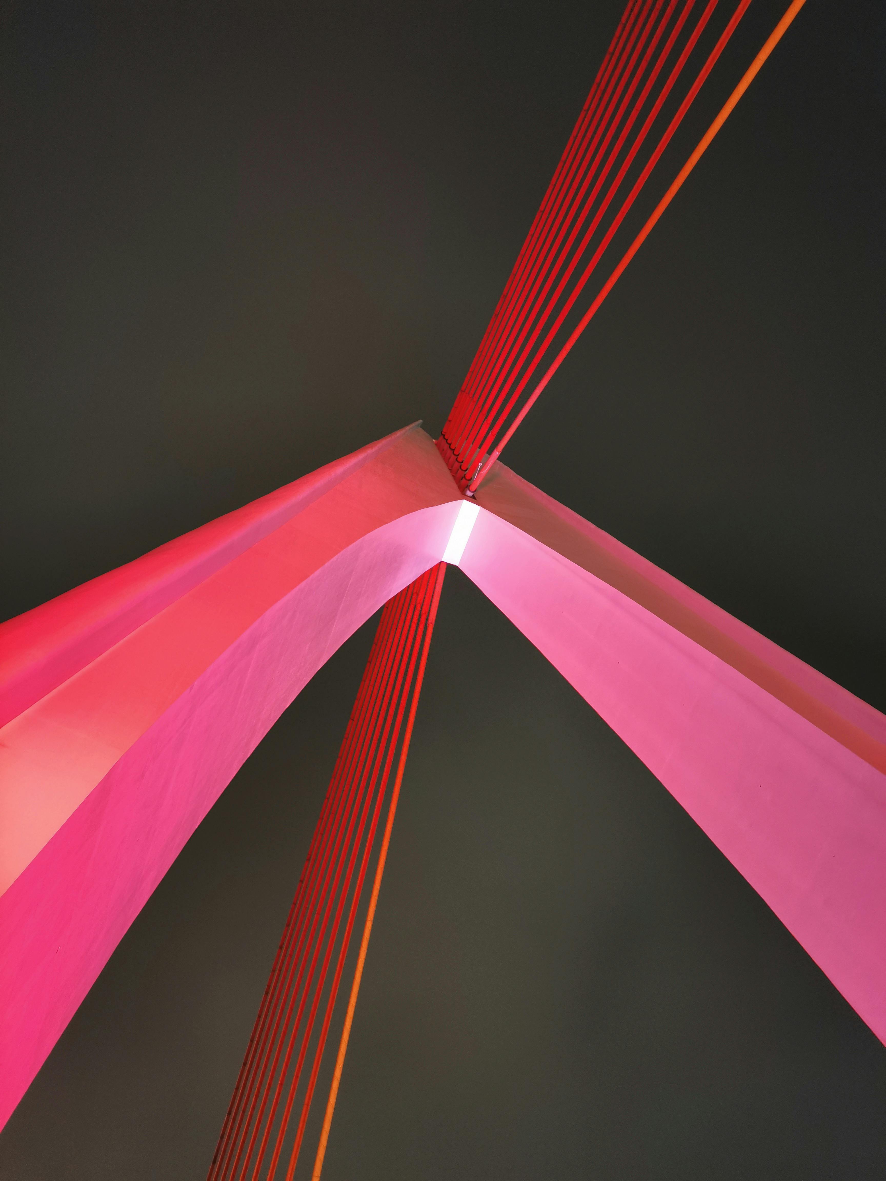 A close up of a pink and red bridge · Free Stock Photo