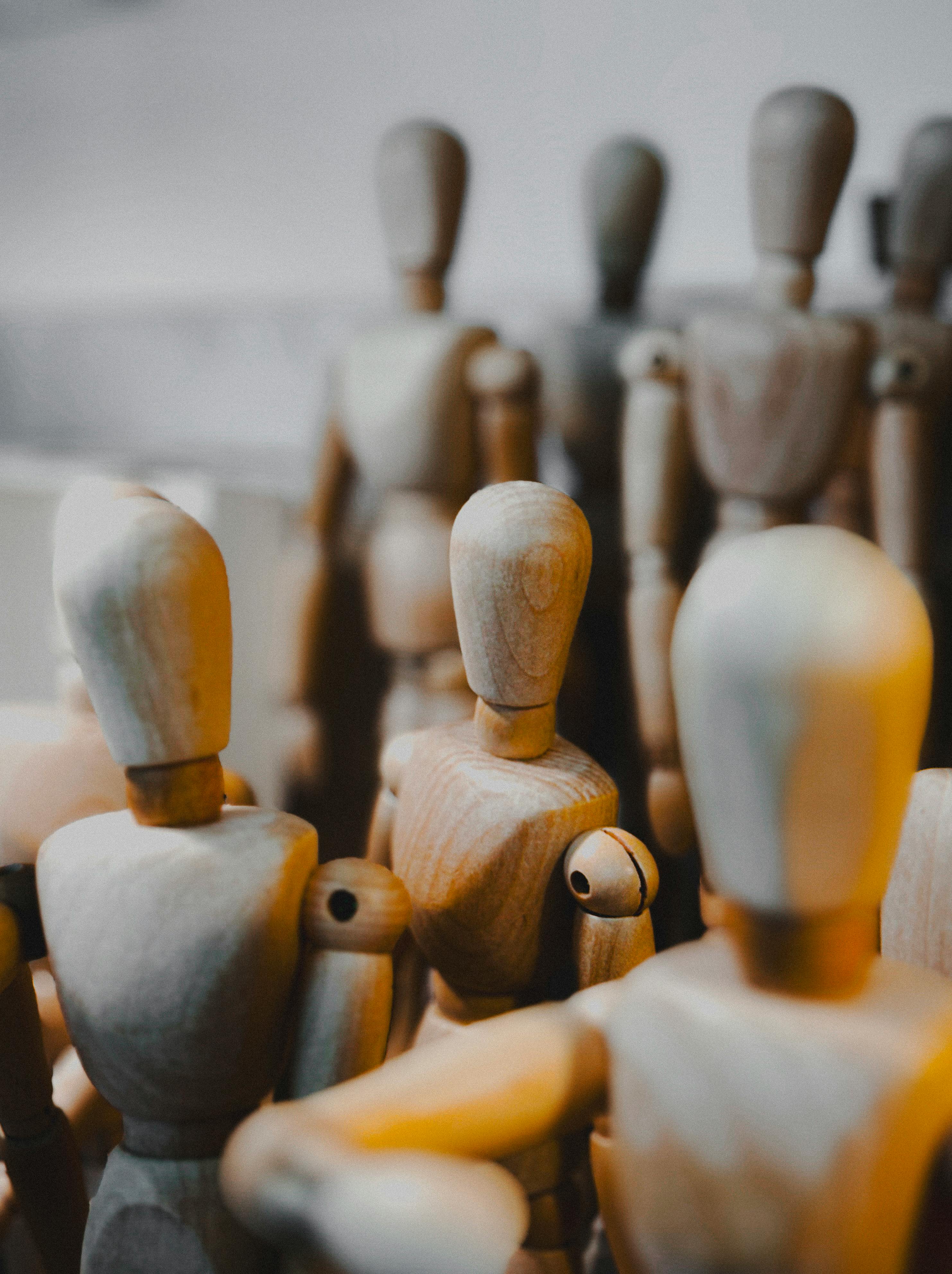 Timelapse Photography of Brown Wooden Puppet Running on a Black Screen ...