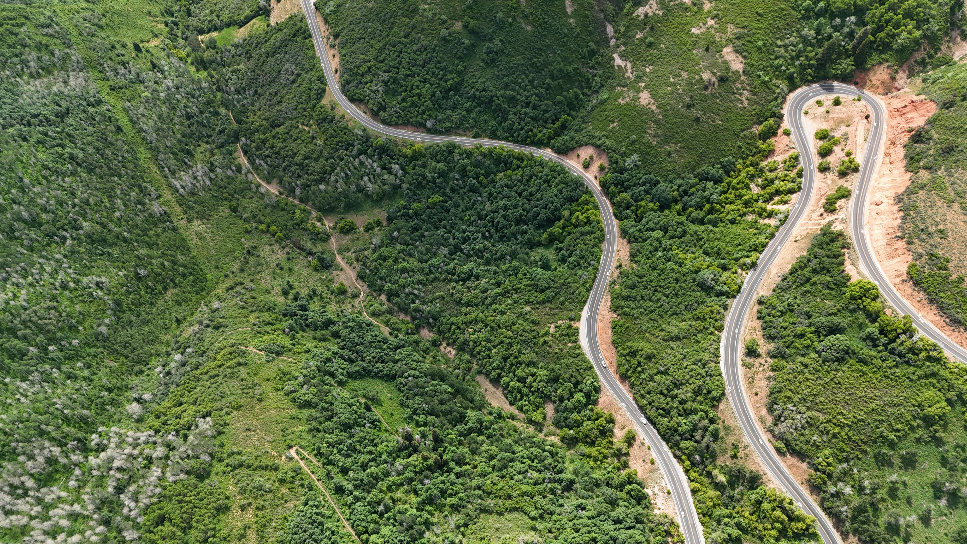 Aerial view of a winding road in the mountains · Free Stock Photo