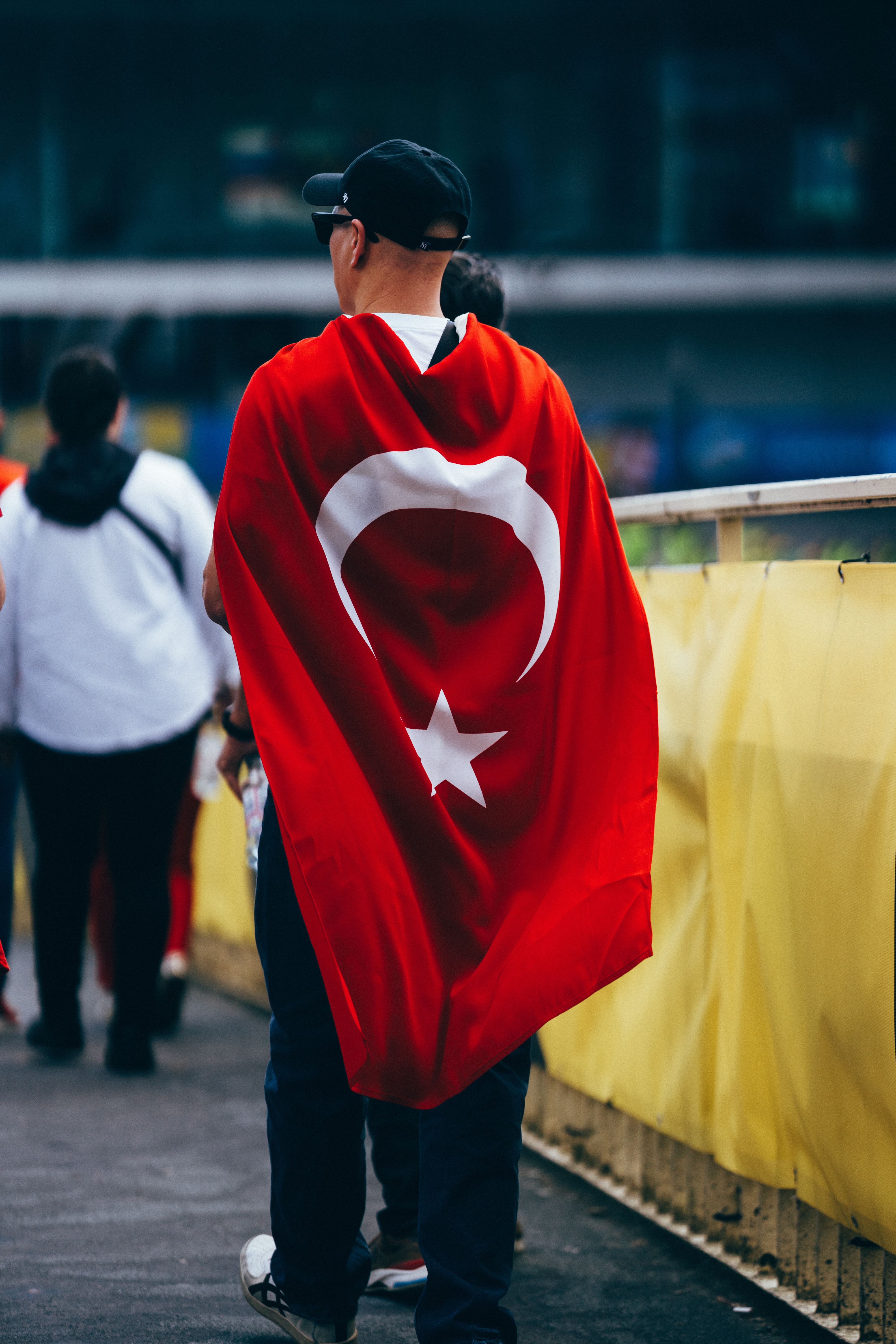 Back View of a Man Wearing a Turkish Flag over His Shoulders · Free ...