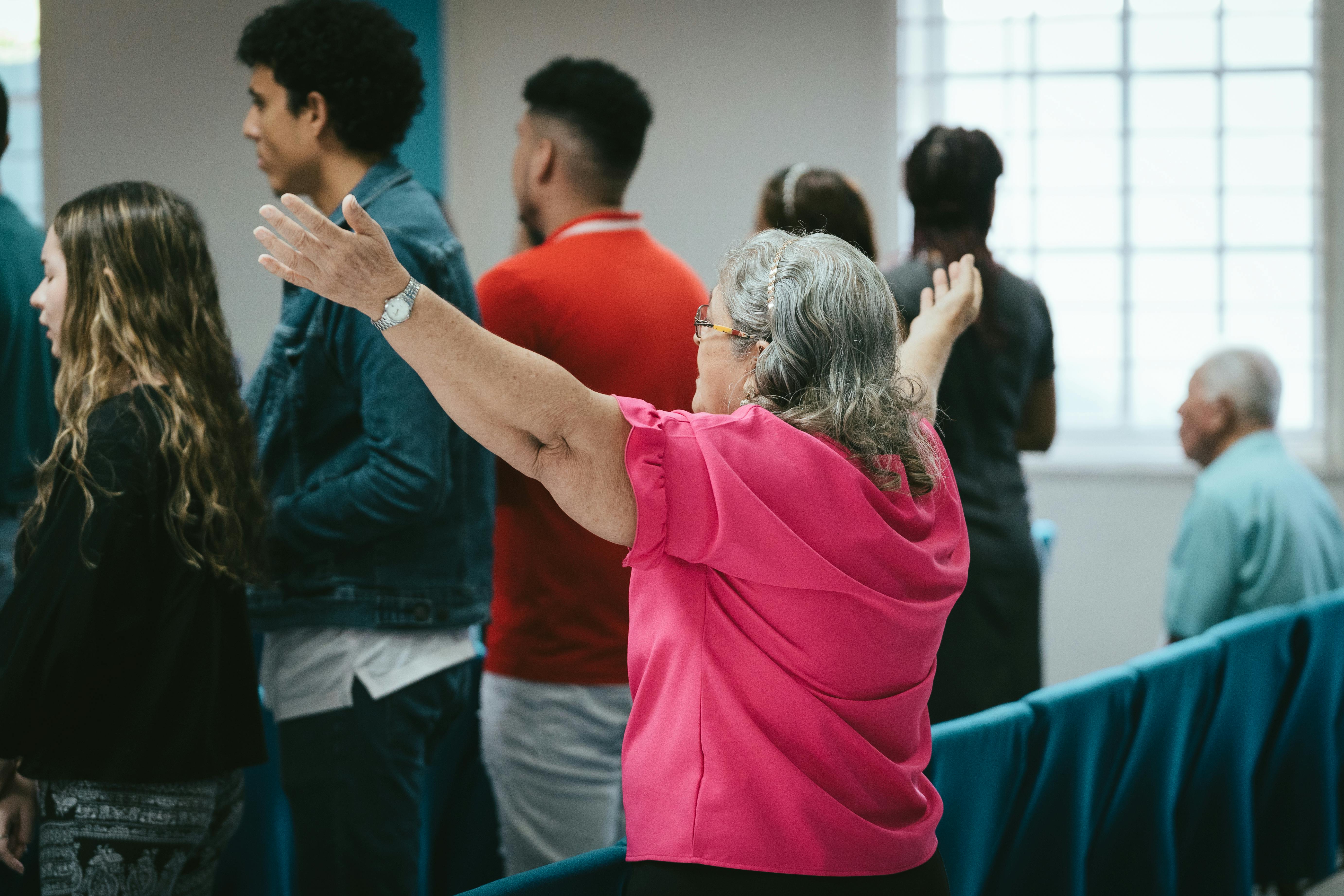 Pious People Praying Together · Free Stock Photo
