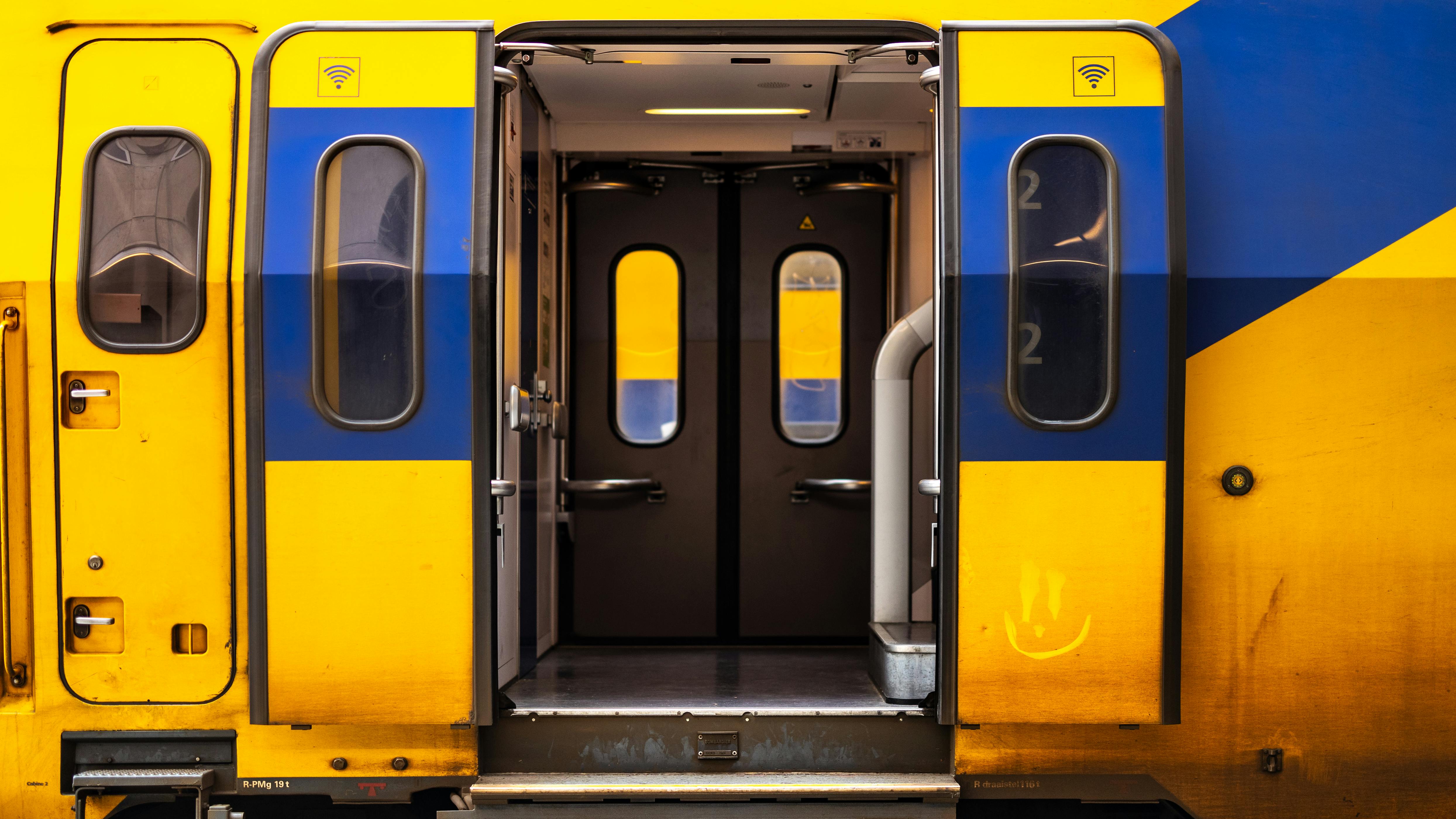 Open Doors of a Train Passenger Car · Free Stock Photo