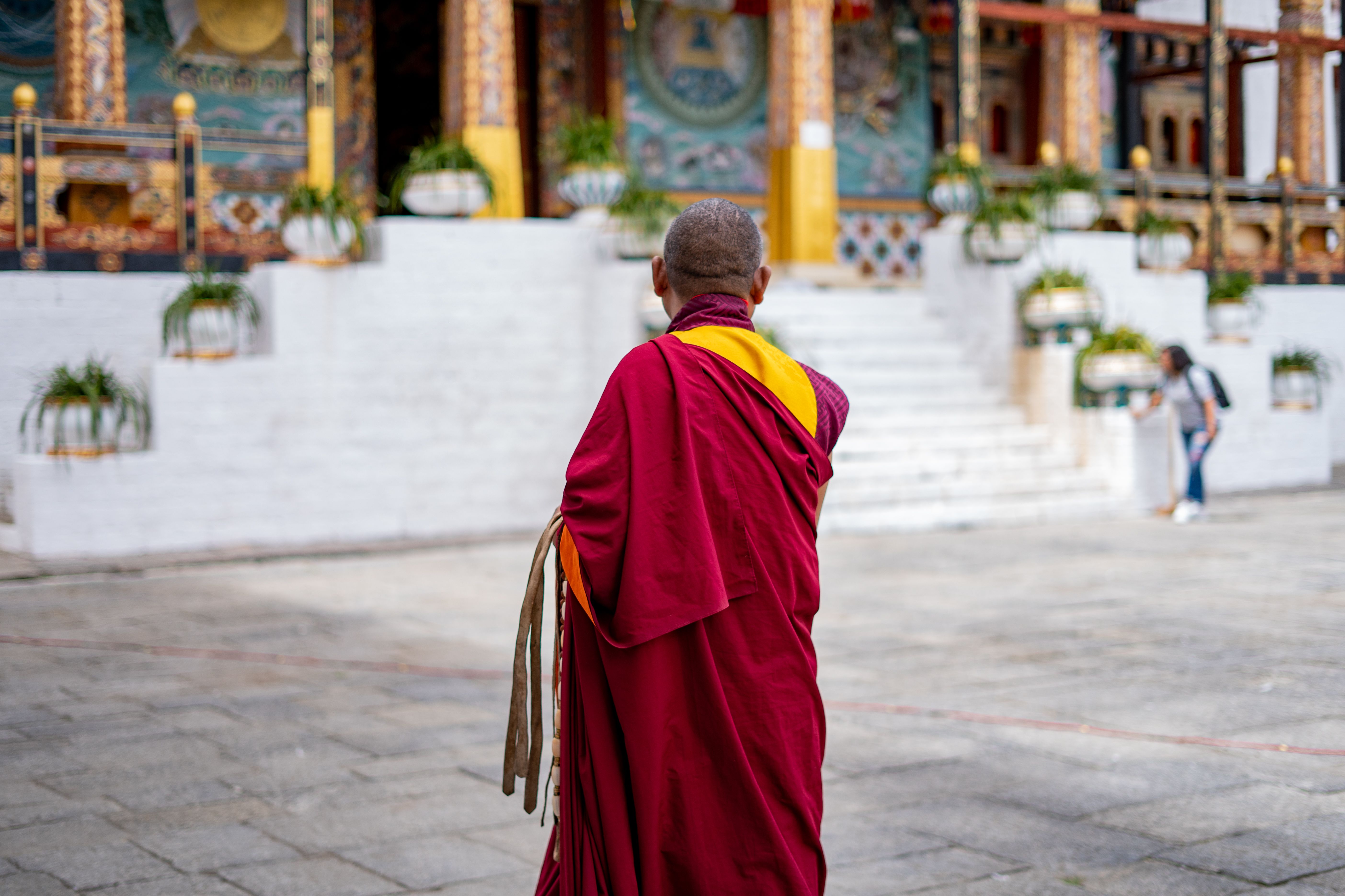 Small Monk Outside Buddhist Monastery · Free Stock Photo