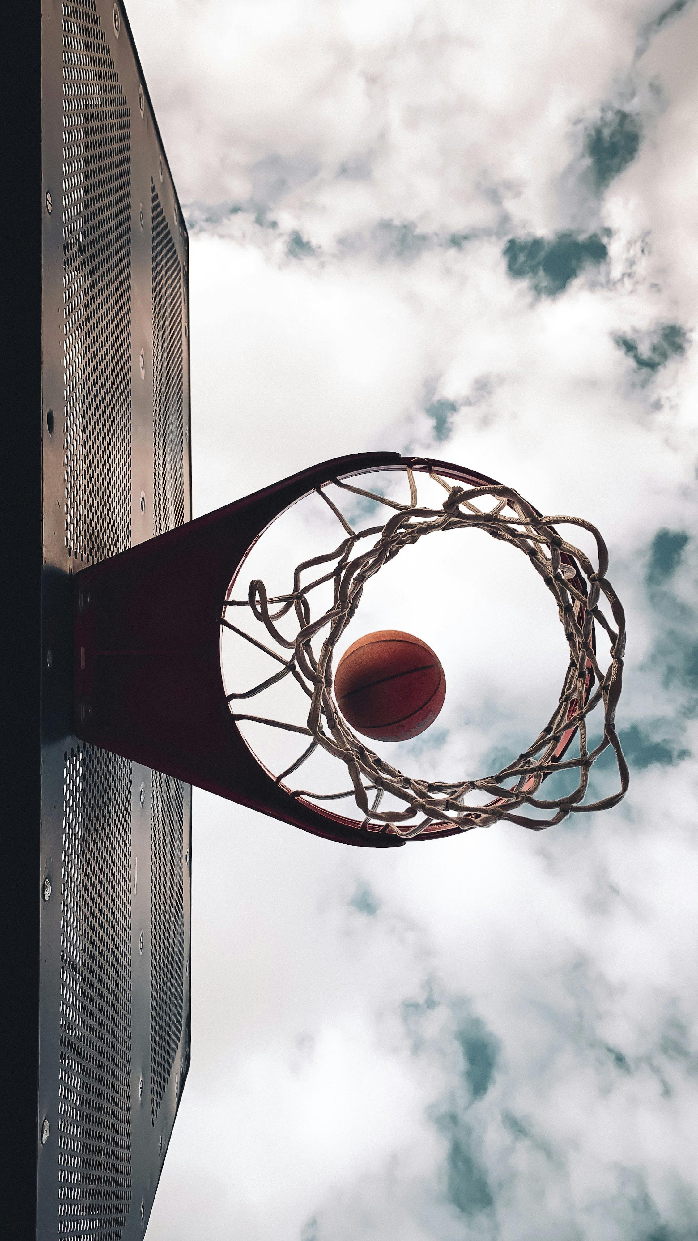 Basketball Hoop Reflecting on Water · Free Stock Photo