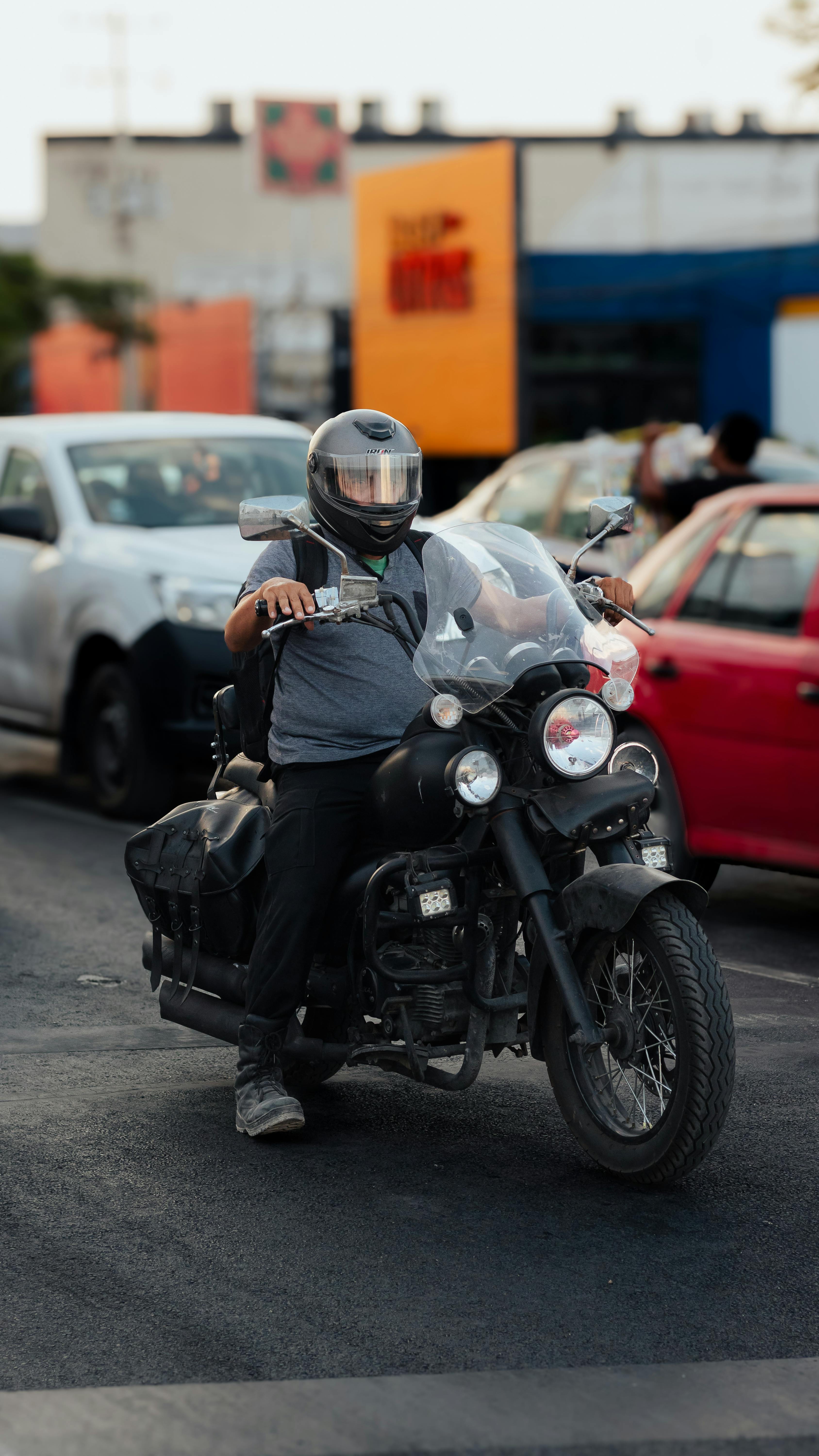 Man Standing Beside Motorcycle · Free Stock Photo