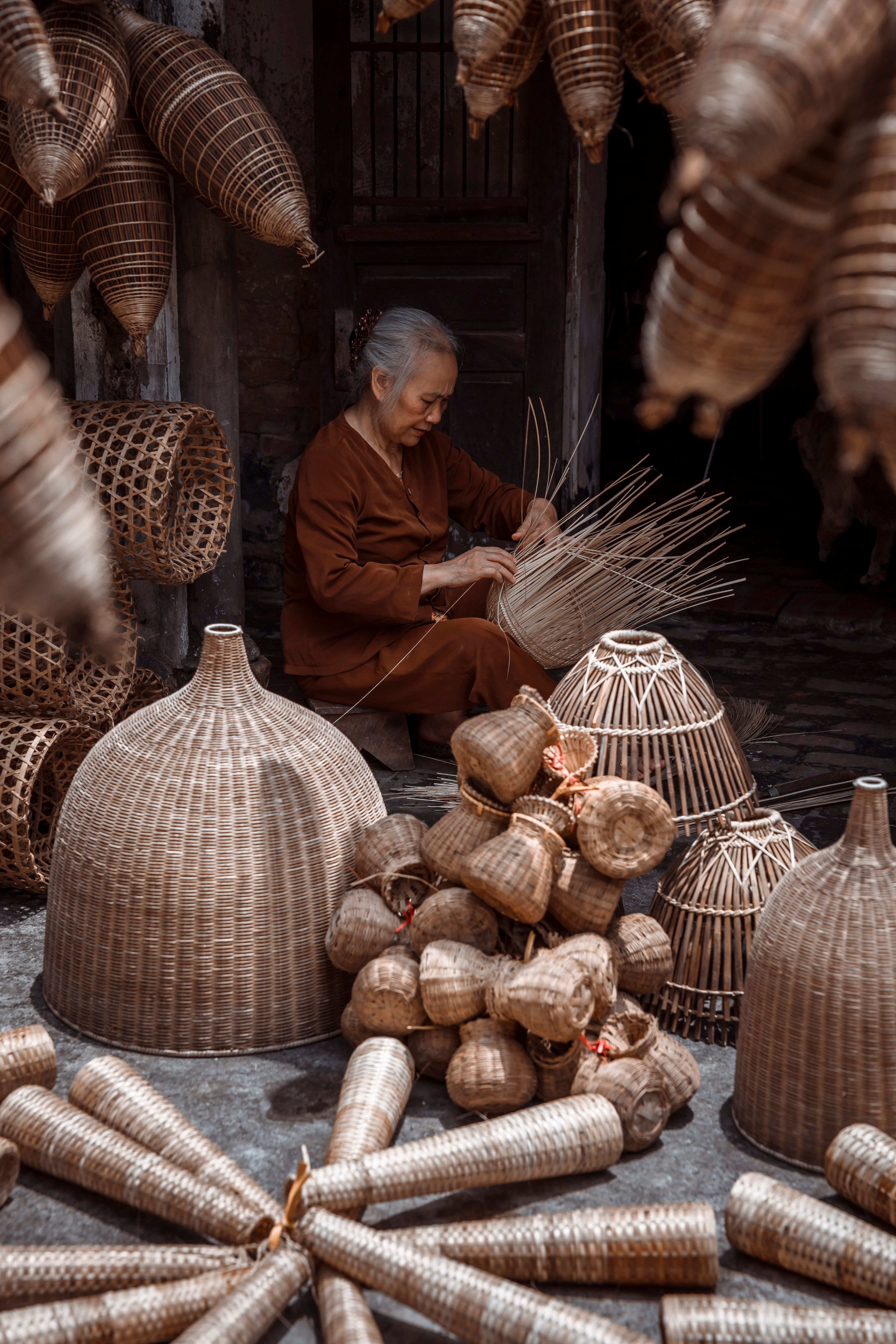 Man Selling Baskets on a Street · Free Stock Photo