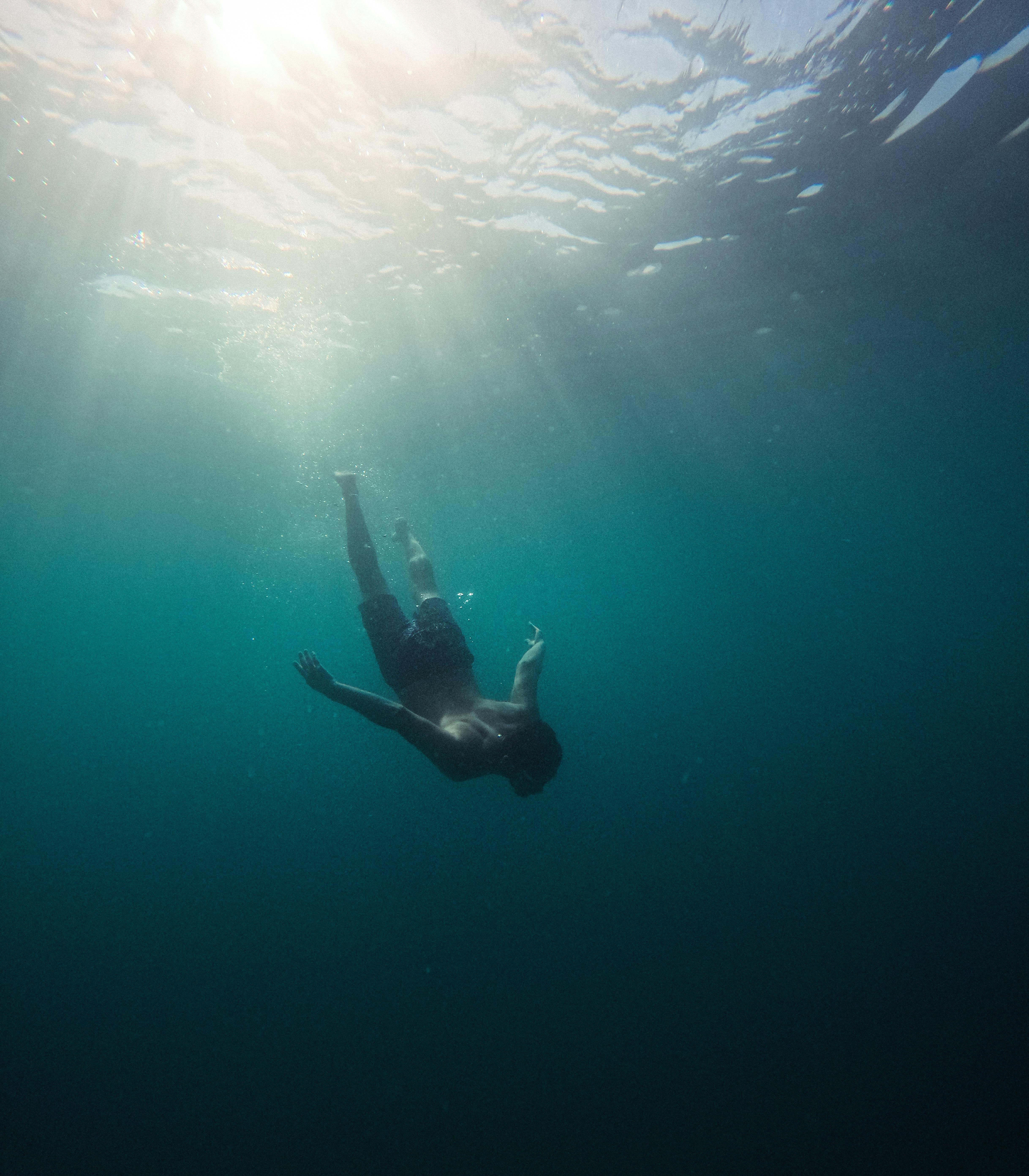 Man Diving in Sea · Free Stock Photo