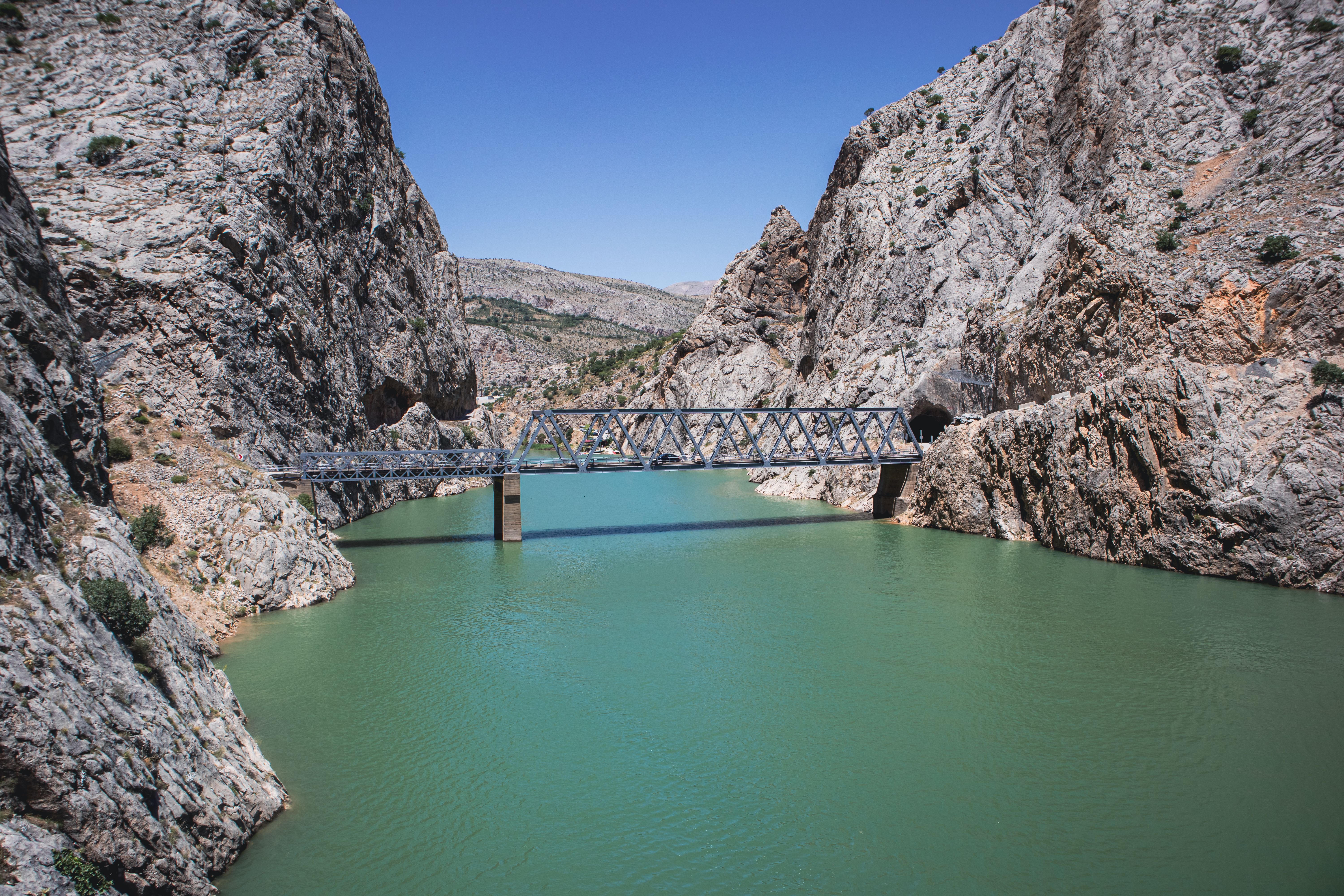A Steel Bridge over the River in a Canyon Gorge · Free Stock Photo