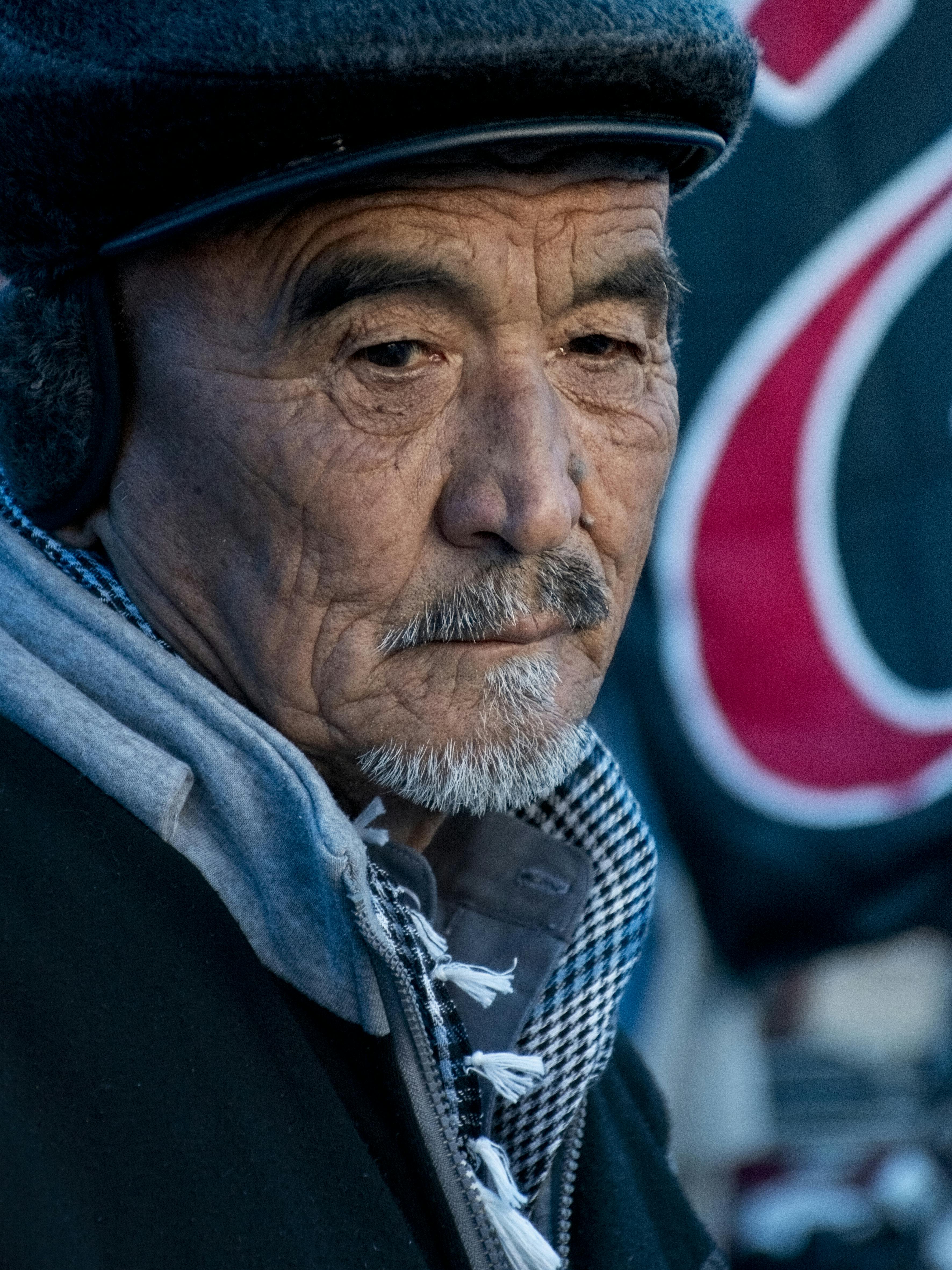 Portrait of an Elderly Man with a Gray Stubble · Free Stock Photo