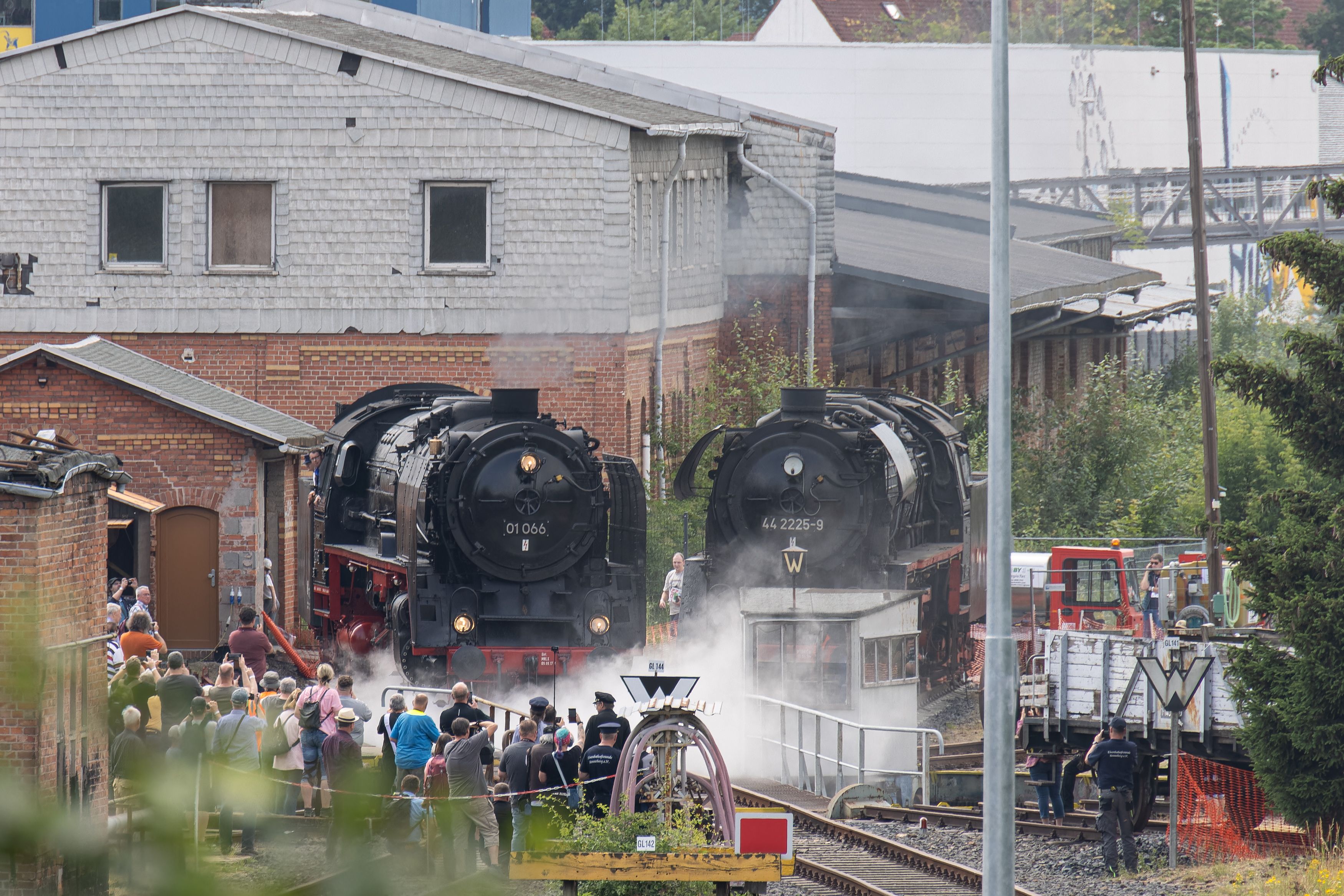 Two Steam Trains Leaving the Station · Free Stock Photo