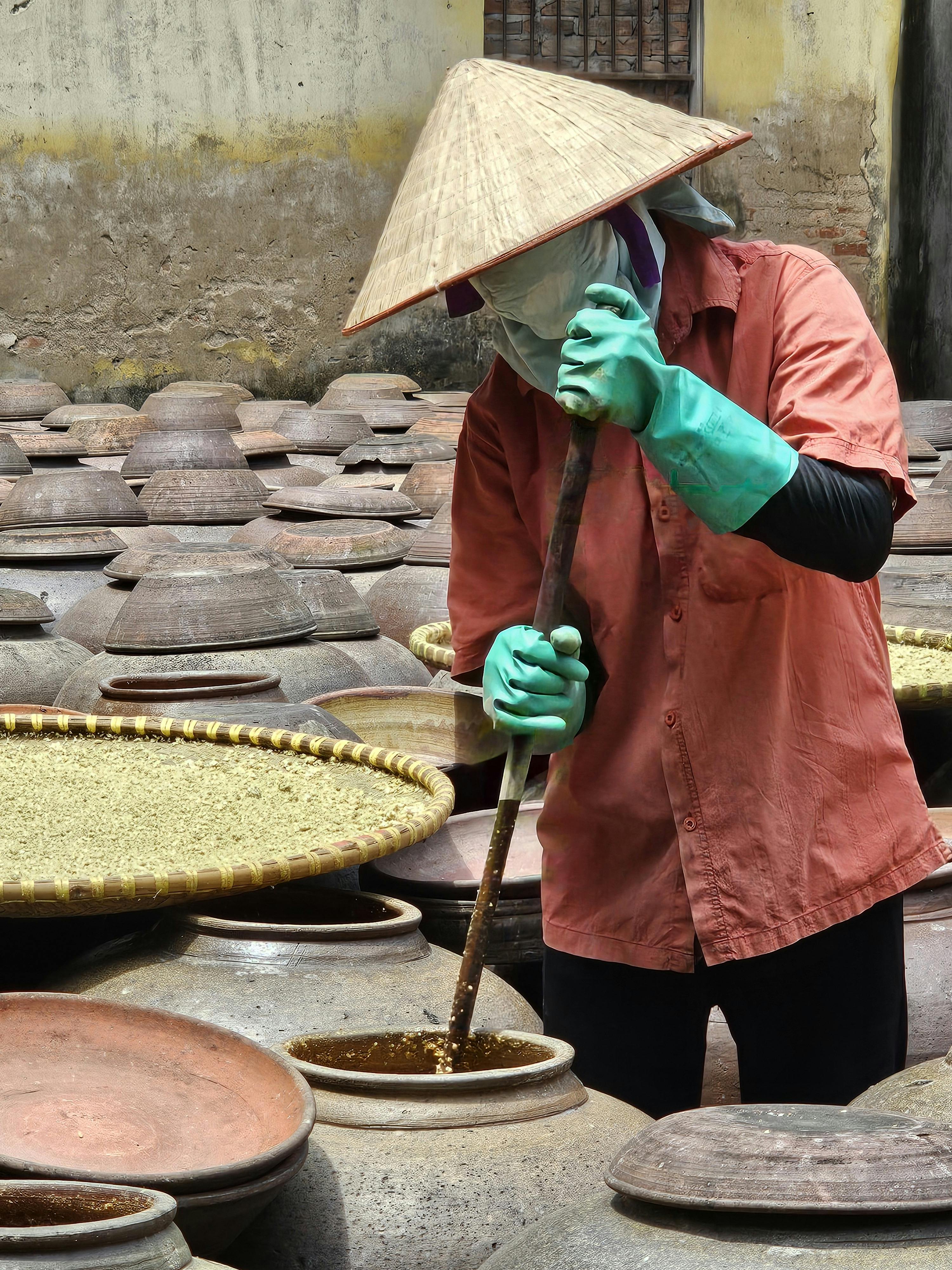 Person Making Soy Sauce · Free Stock Photo