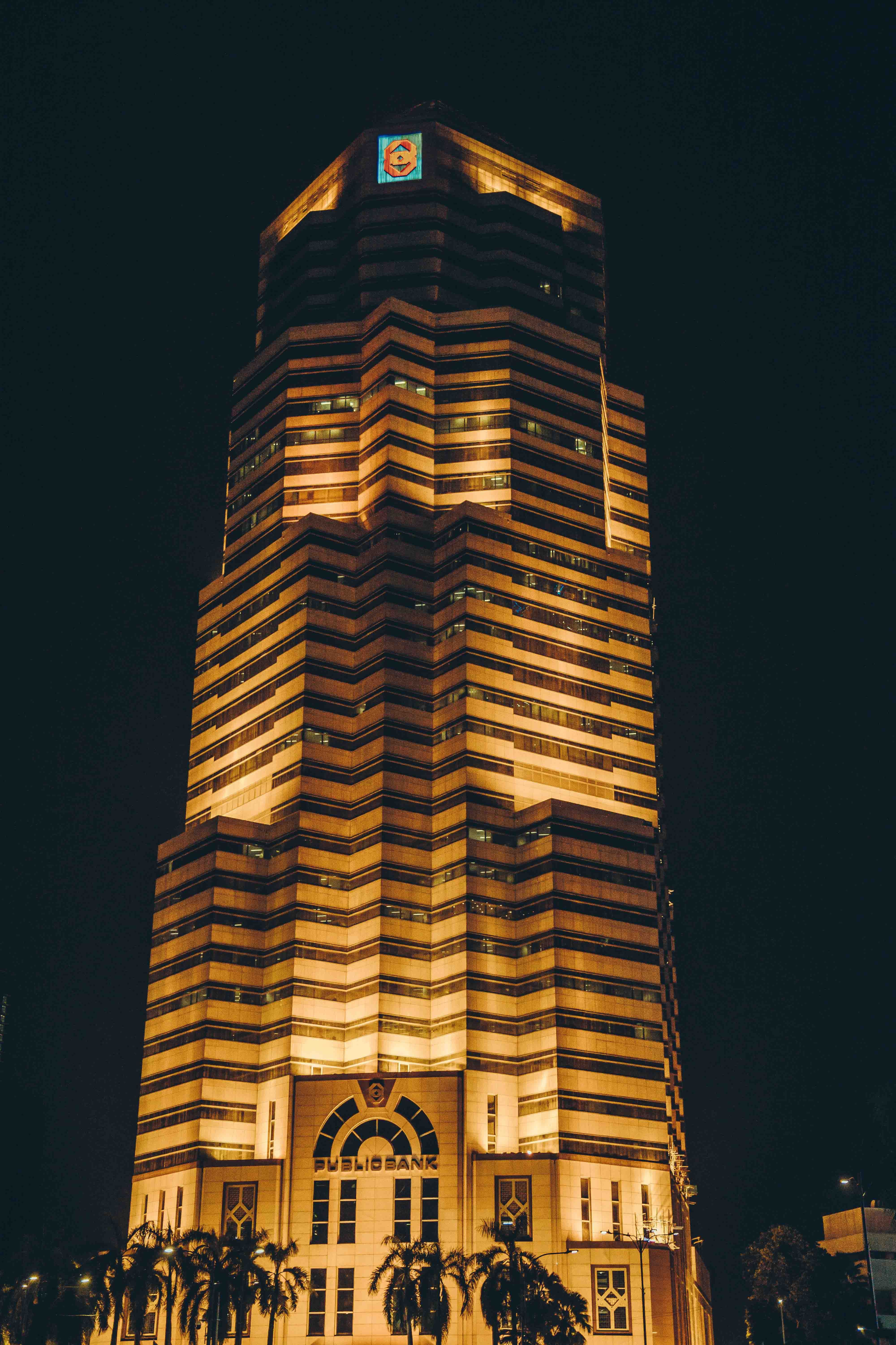 Low Angle Shot of Illuminated Menara Public Bank at Night in Kuala ...