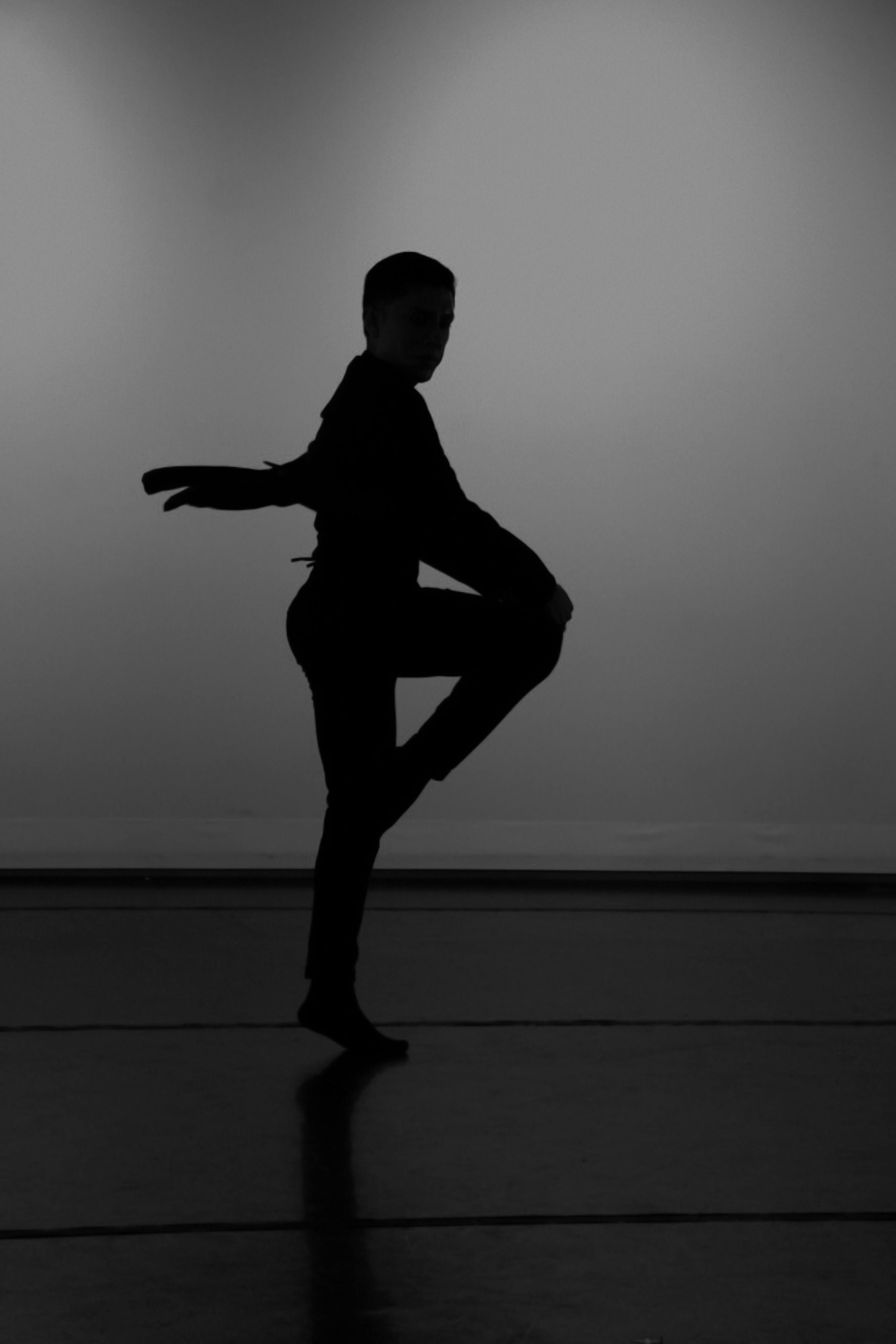 Silhouette of Person Standing on One Leg · Free Stock Photo