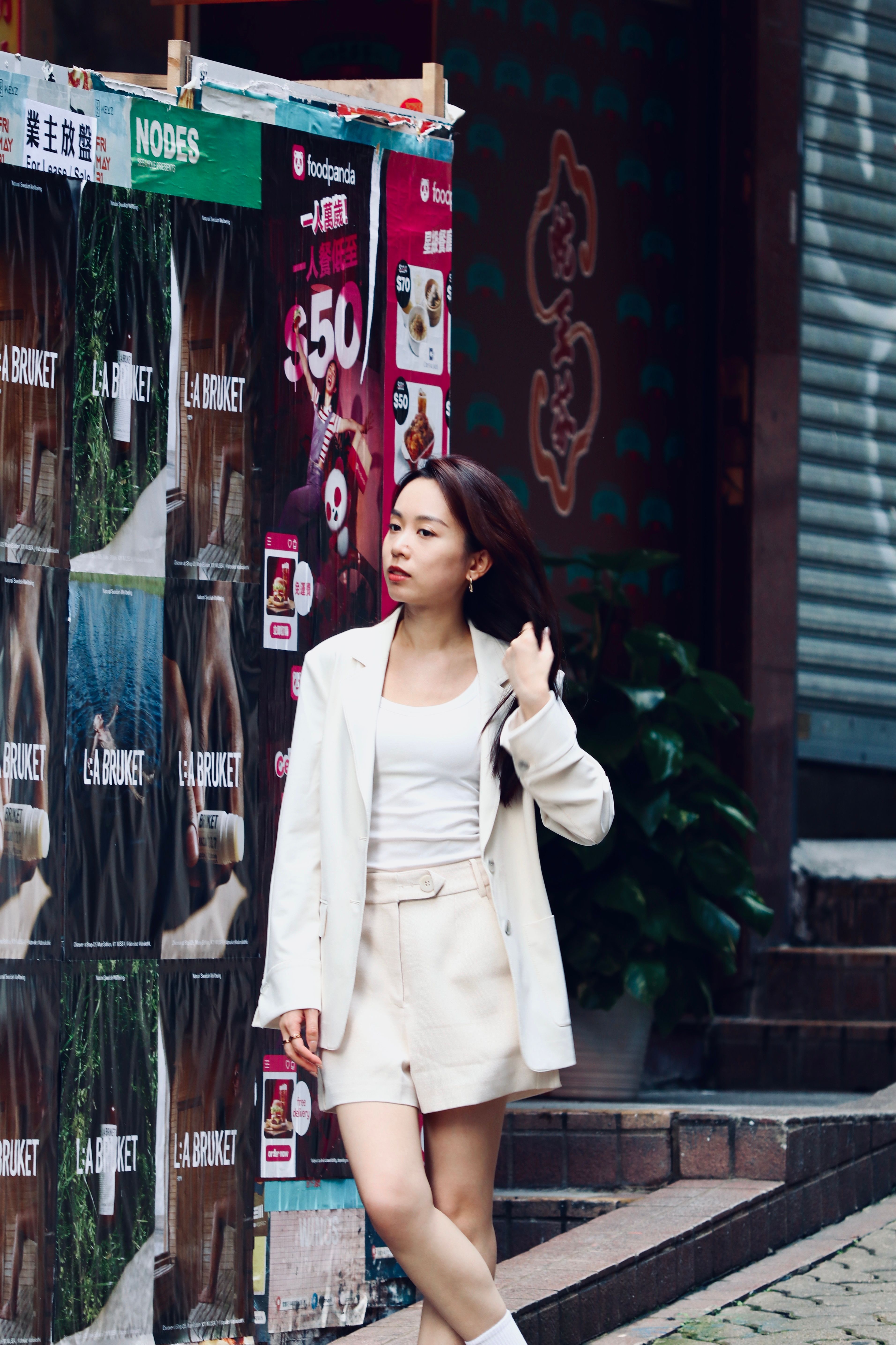 Woman in White Clothes on a Street · Free Stock Photo