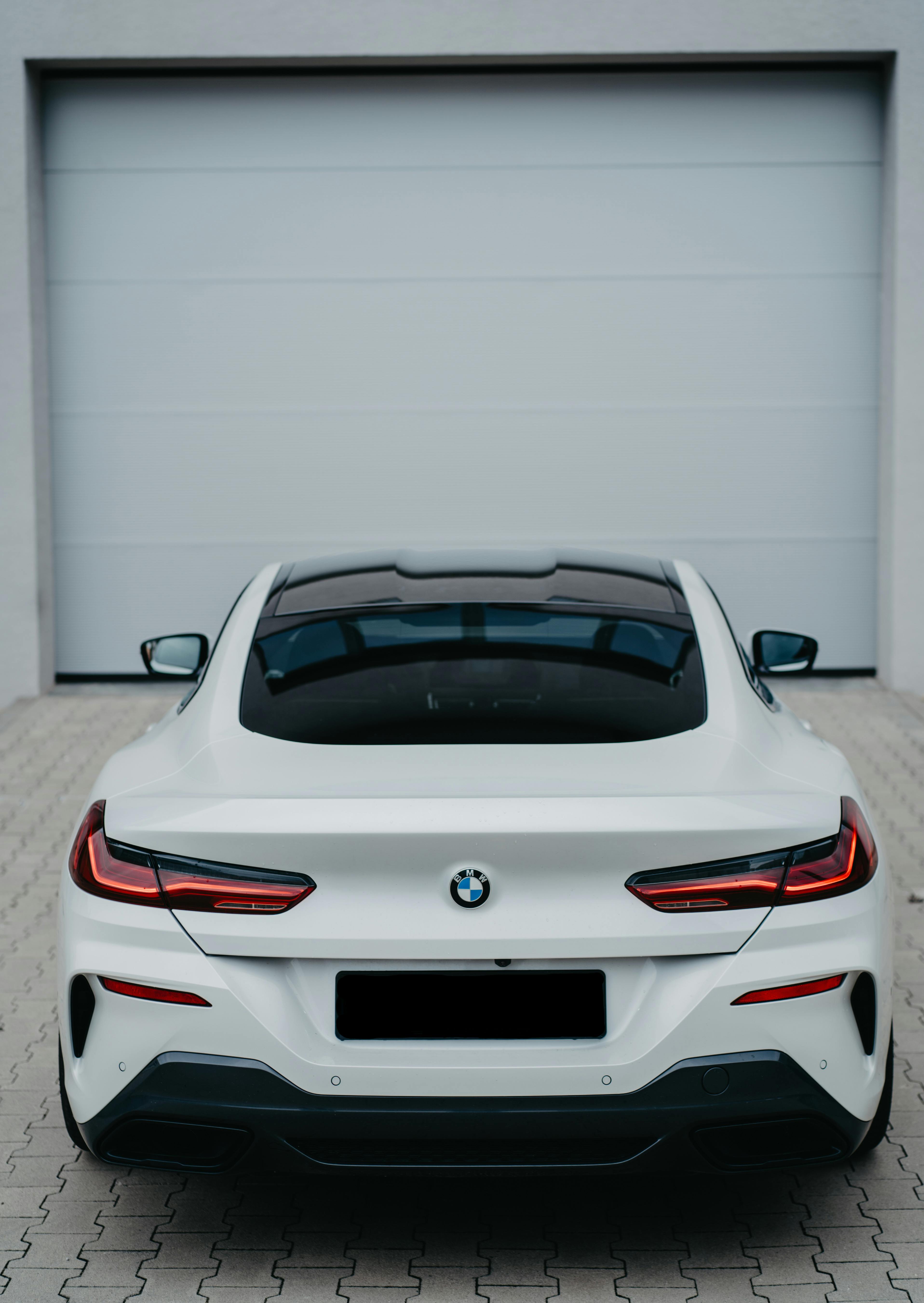 Back View of a White BMW 8 · Free Stock Photo