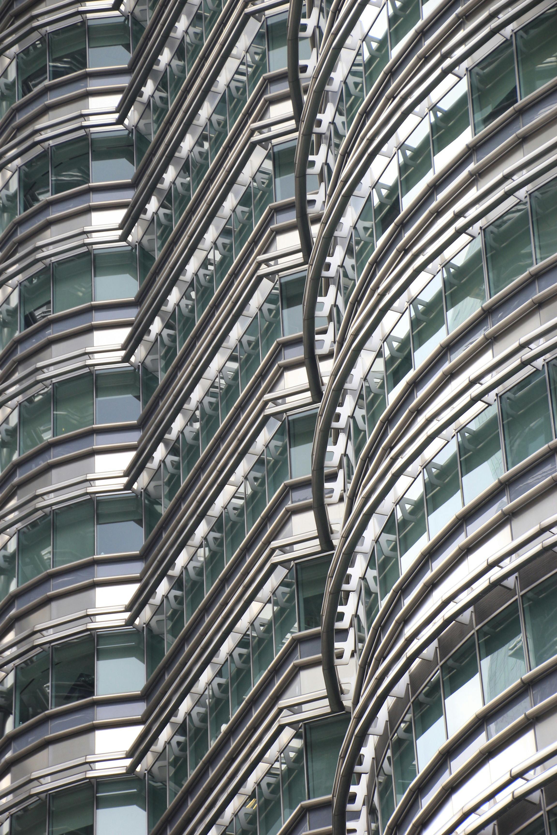 Modern geometric facade of office building · Free Stock Photo