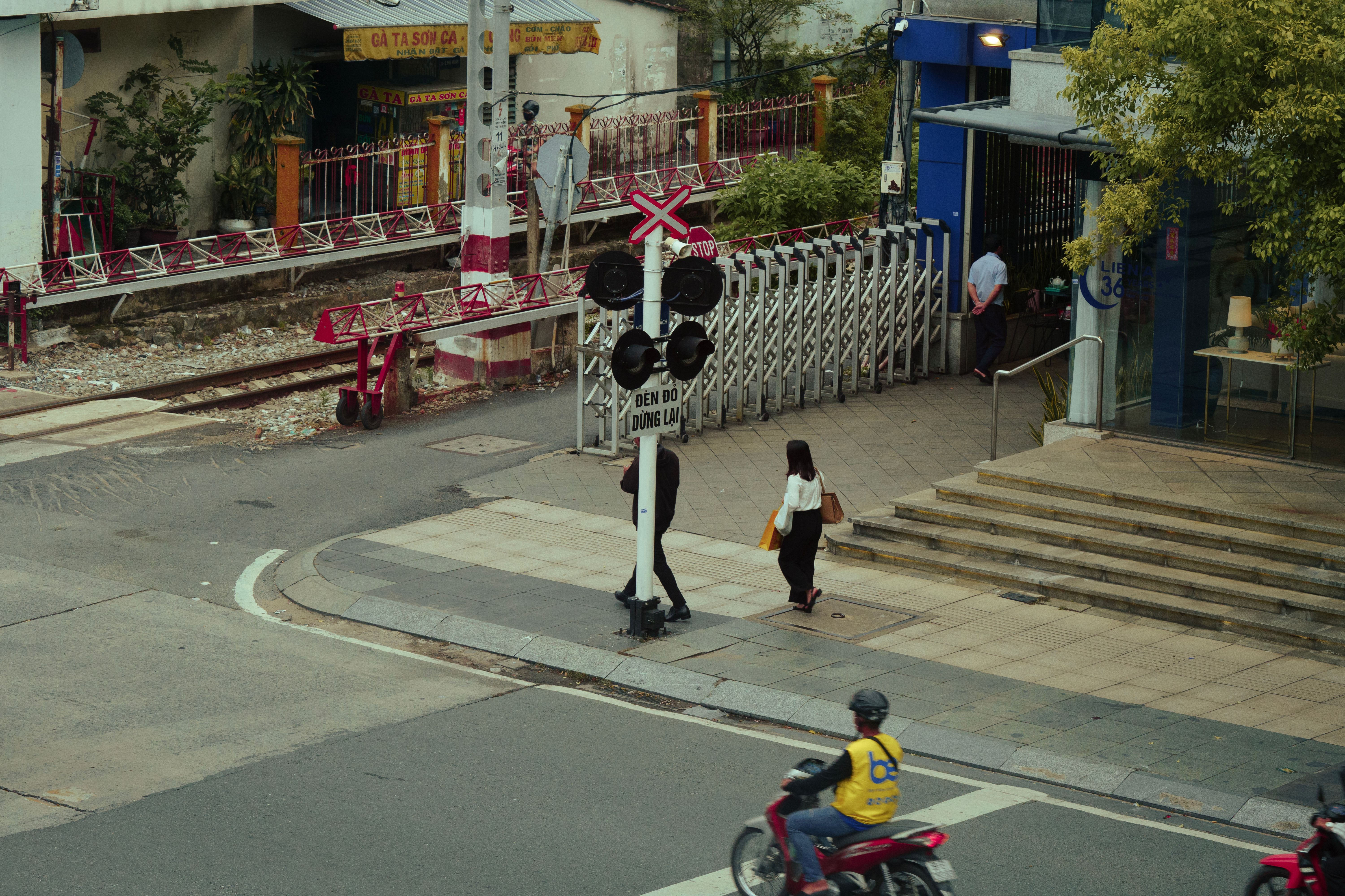 Railway Crossing in the Middle of a City · Free Stock Photo