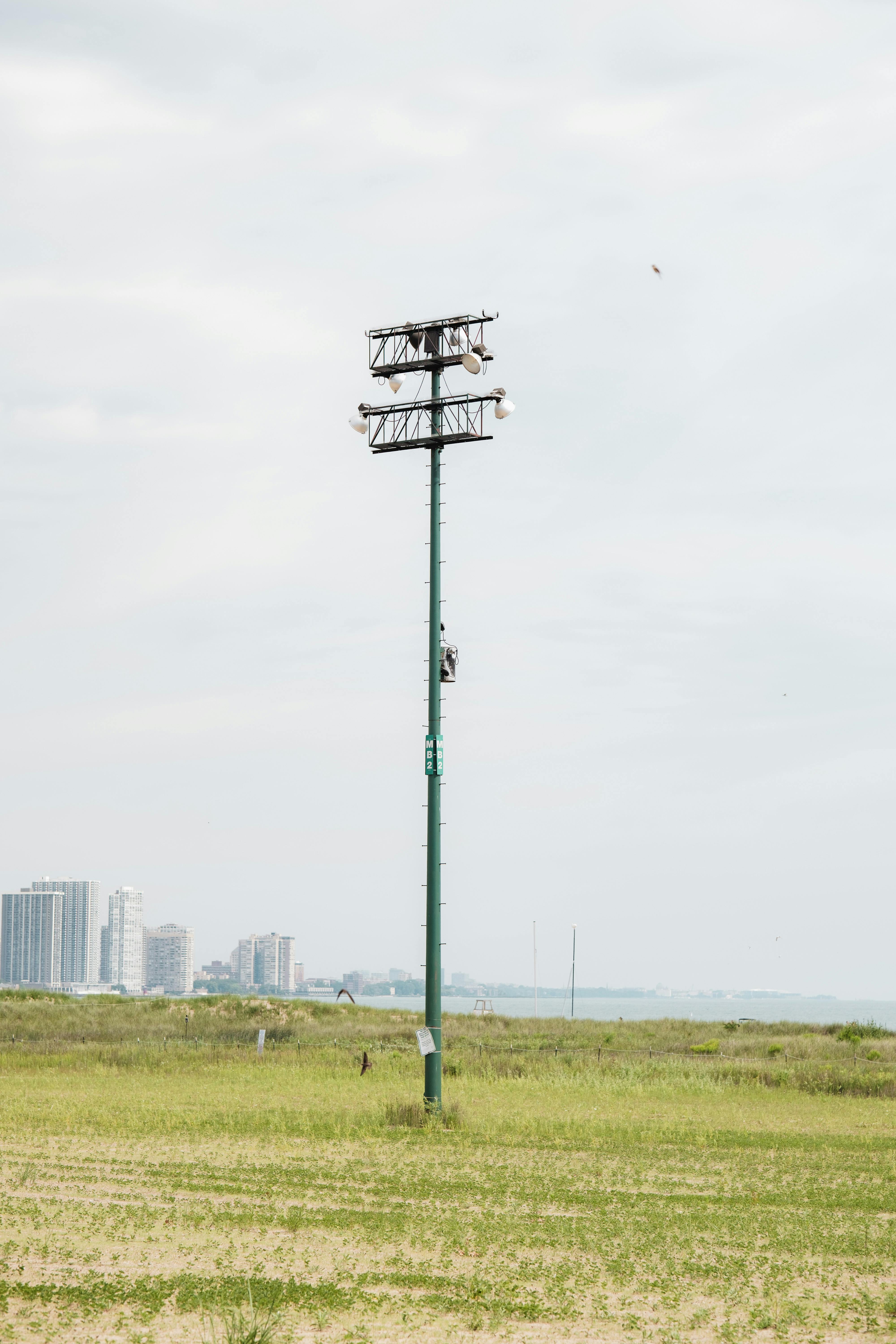 Light Tower in Field · Free Stock Photo