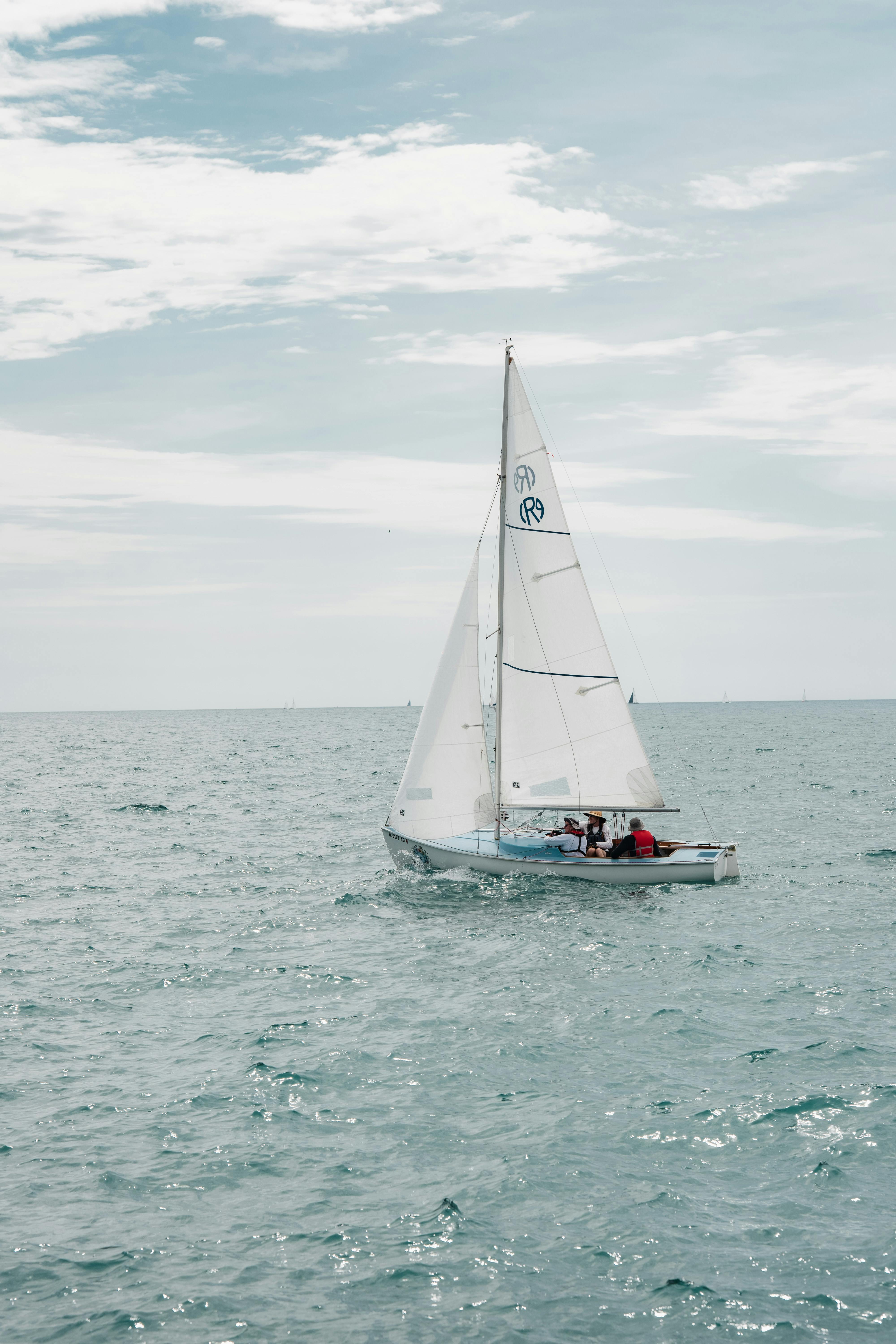 People Sailing on a Boat Against Seascape Background · Free Stock Photo