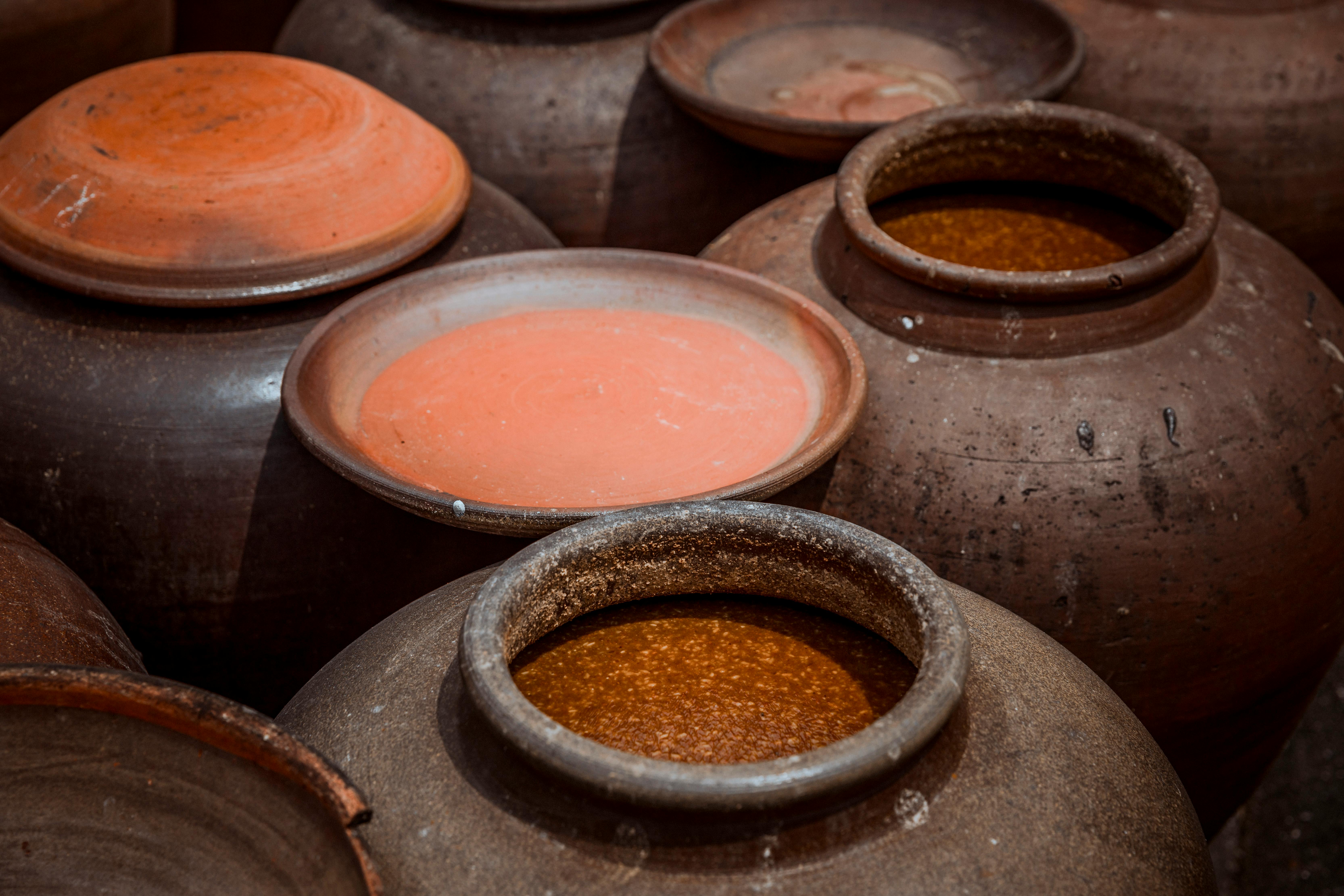 Liquids in Ceramic Pots · Free Stock Photo
