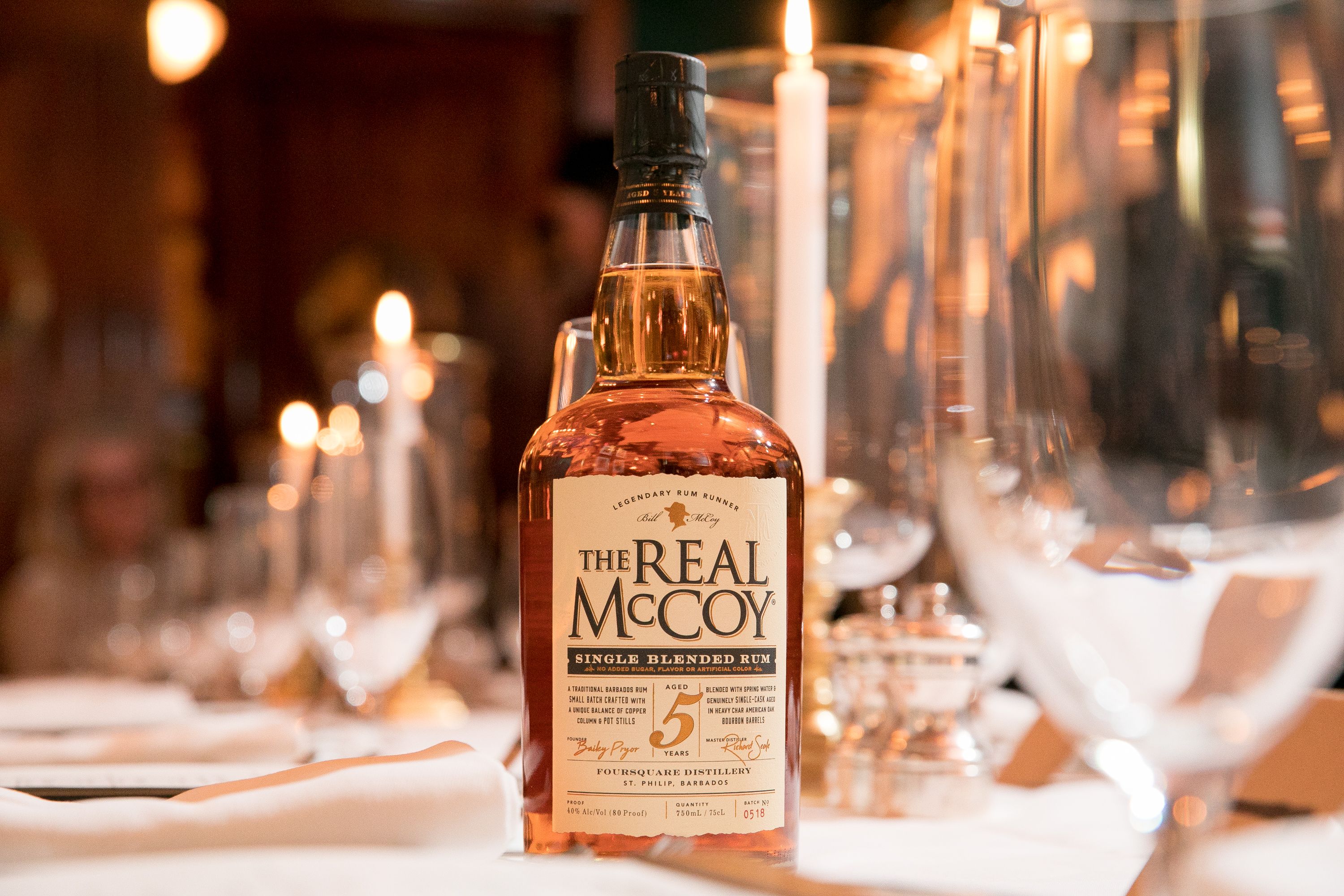 The Real McCoy Aged 5 Years Bottle of Rum Standing on the Table · Free ...