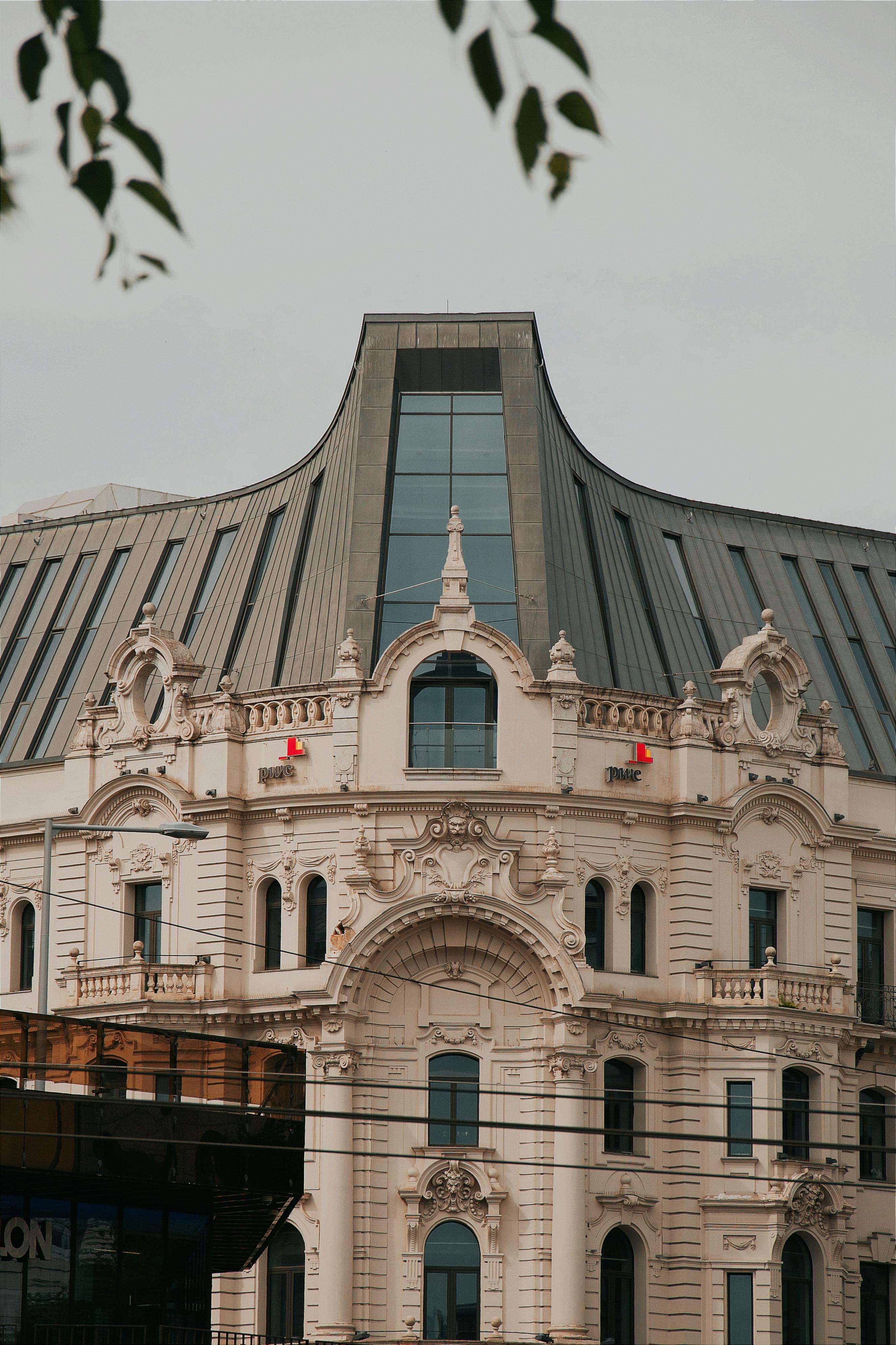 Worm's Eye View of Pink Concrete Building Under Blue Sky · Free Stock Photo