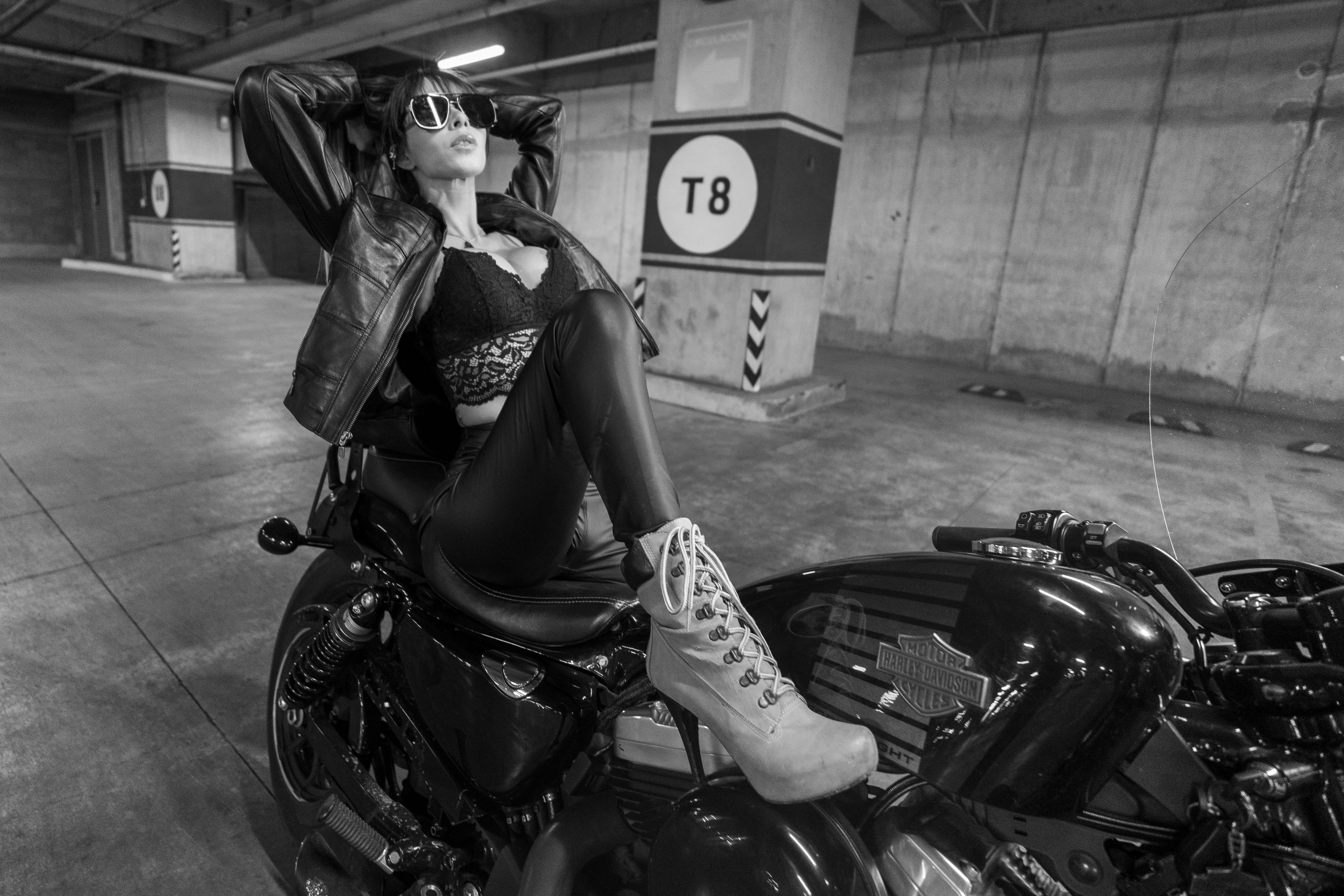 A Woman Posing on a Motorcycle · Free Stock Photo