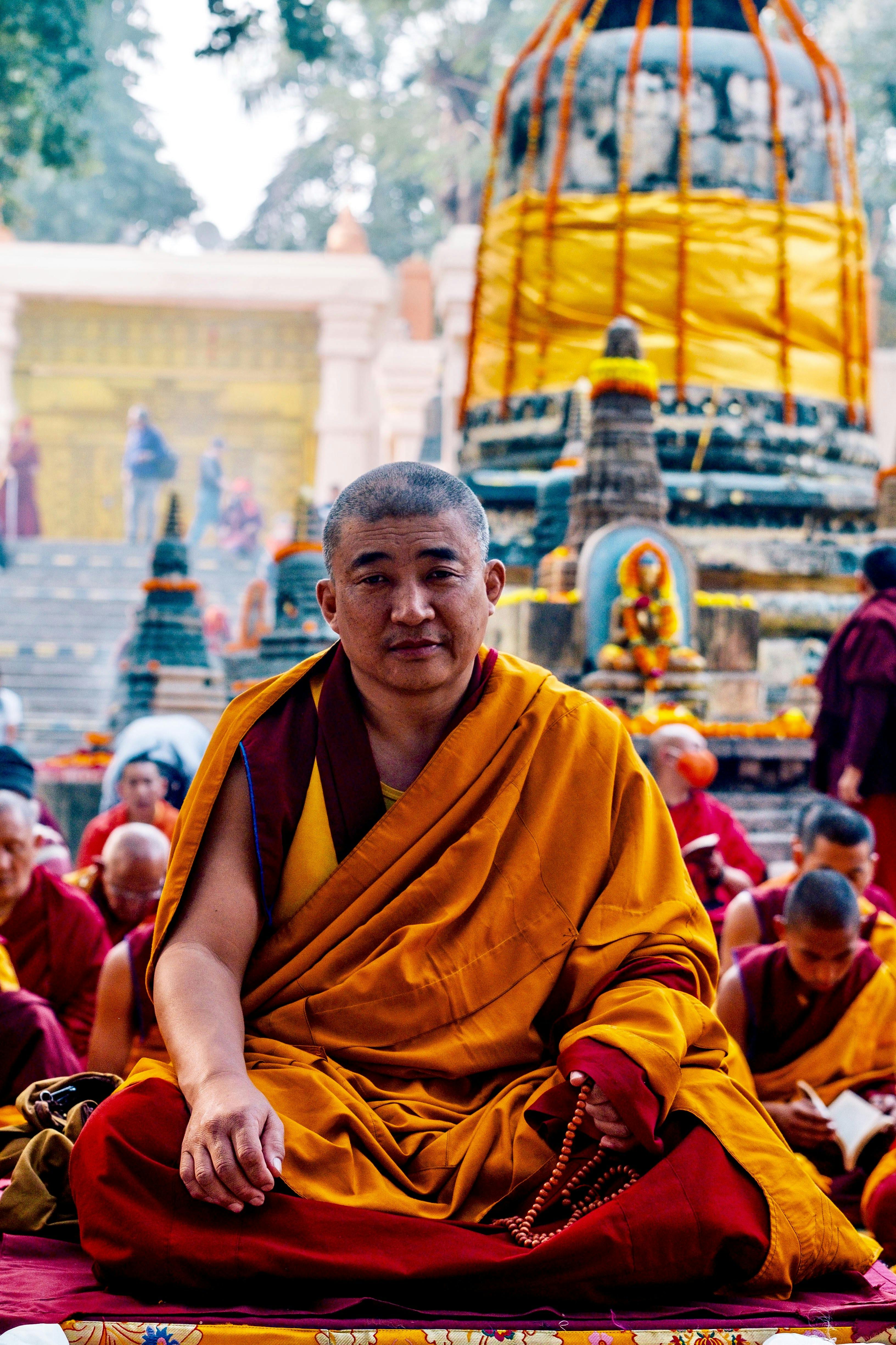 Photo of a Monk Praying · Free Stock Photo