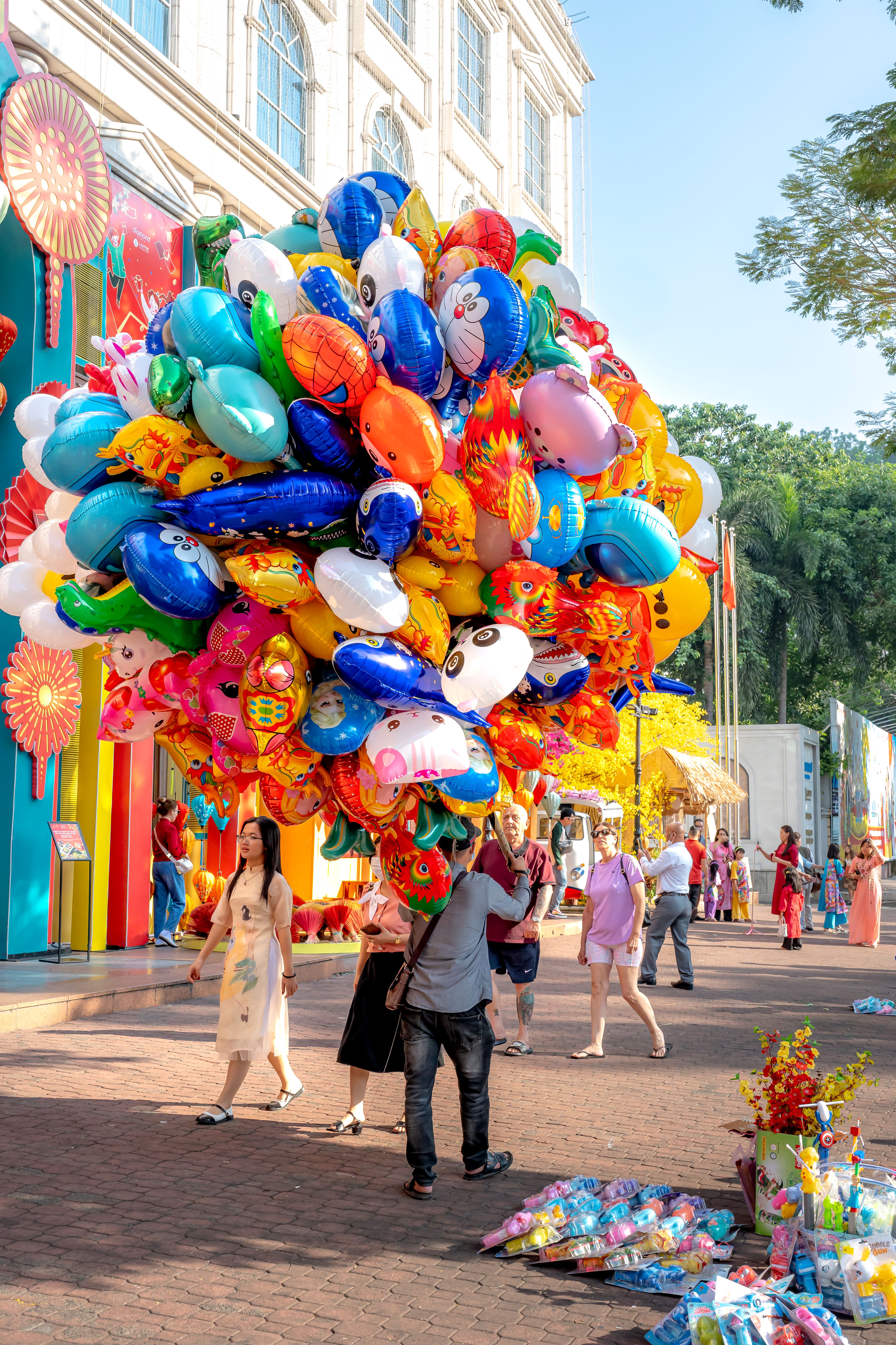 Street Vendor with Colorful Balloons at Park · Free Stock Photo