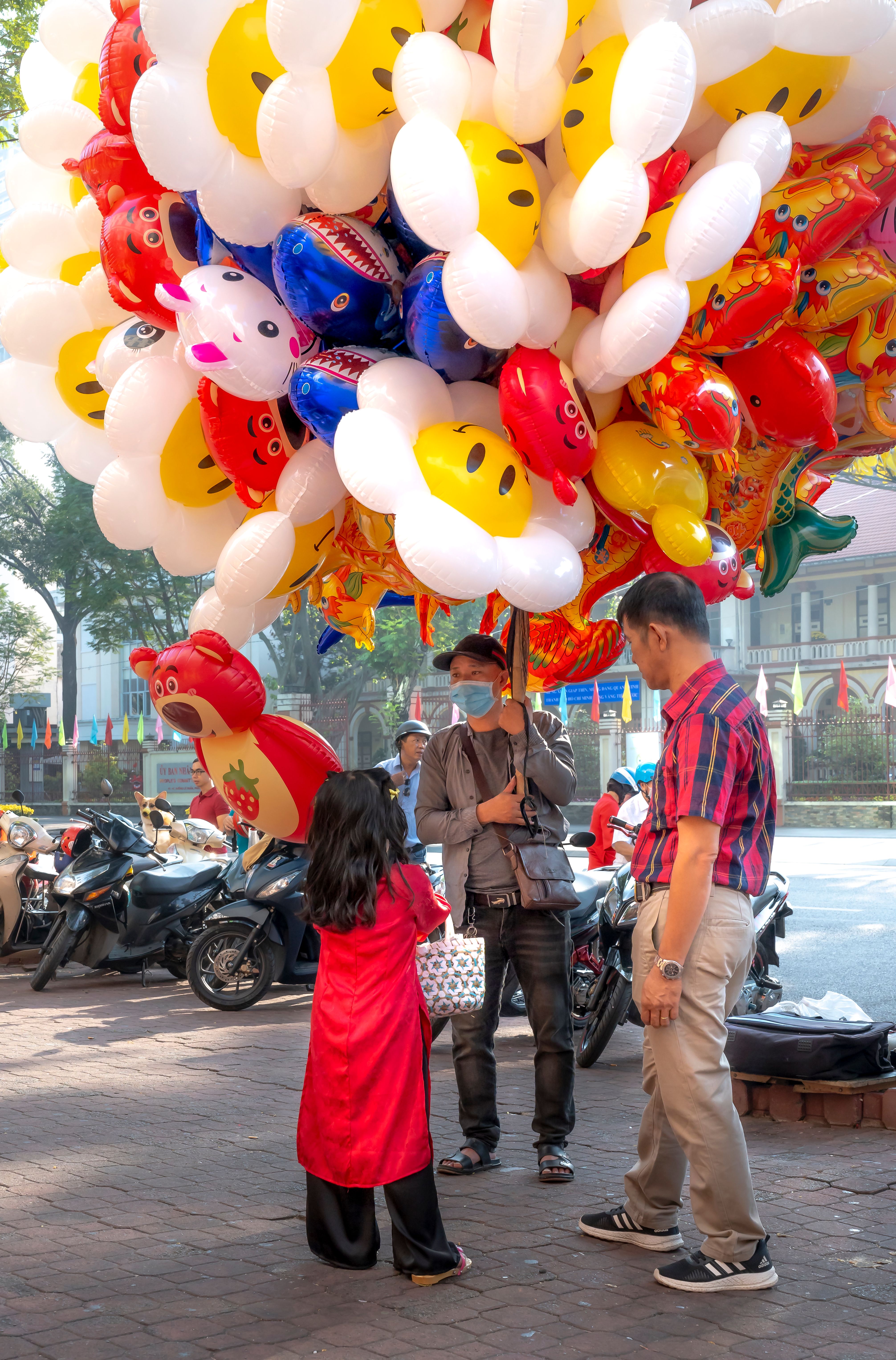 A Man Selling Balloons on the Street · Free Stock Photo