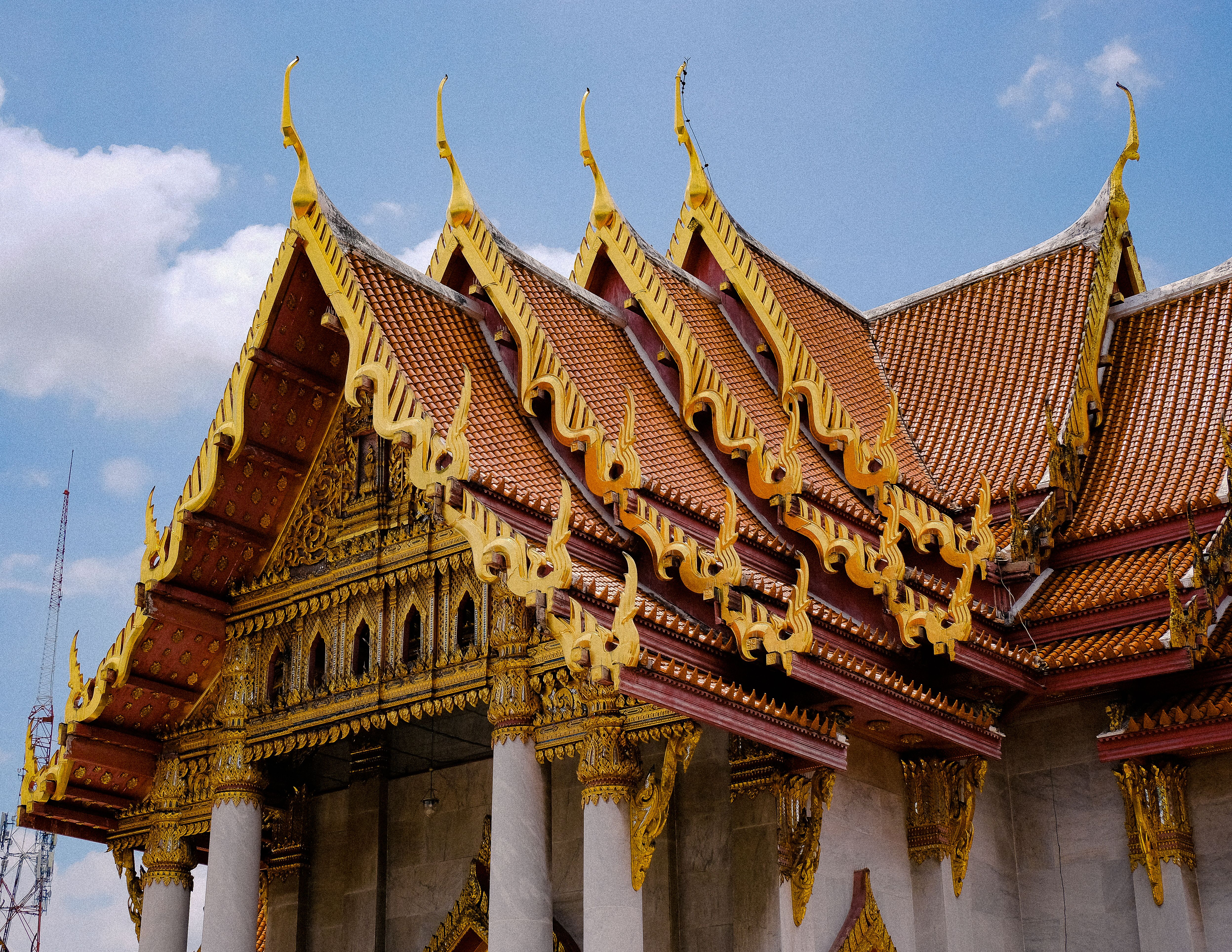 A building with gold roof and pillars · Free Stock Photo