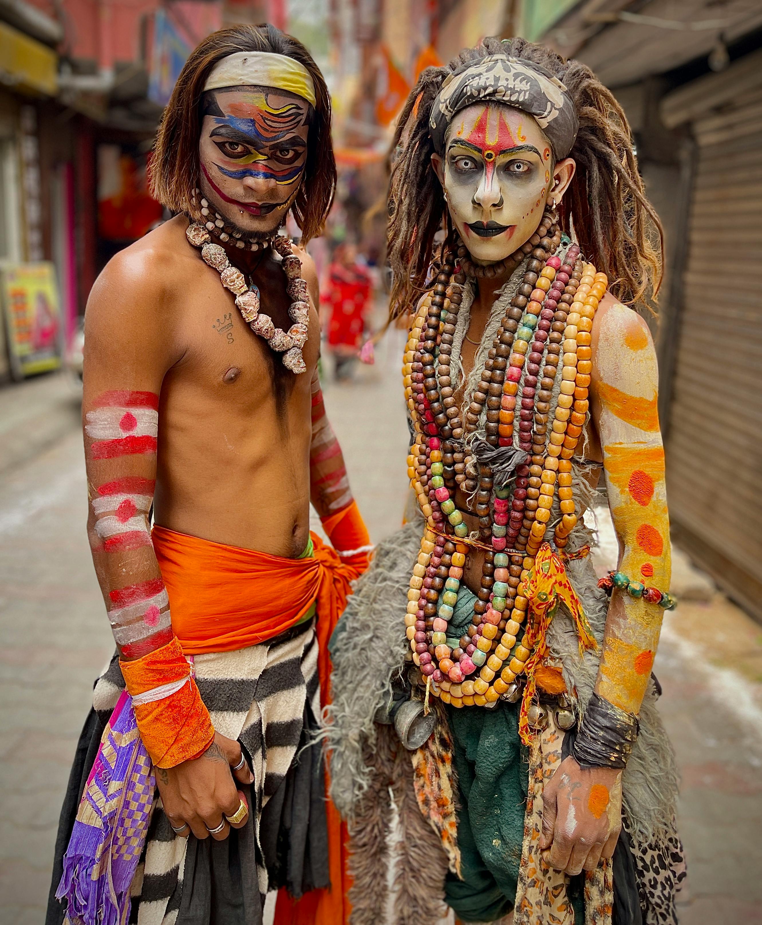Men Standing in Traditional Costumes with Body Paint · Free Stock Photo