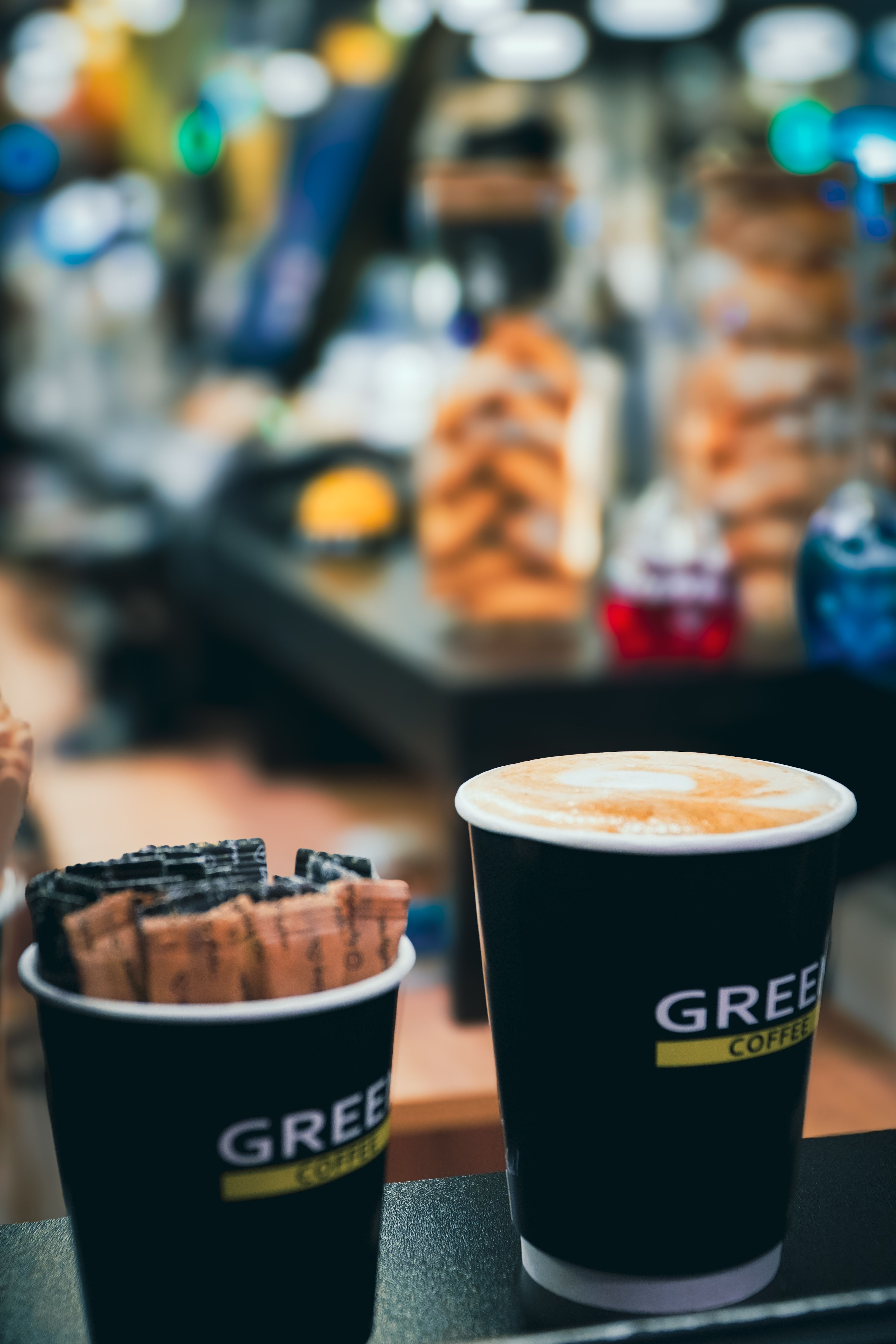 Disposable Cups with Sugar Sachets and Coffee · Free Stock Photo