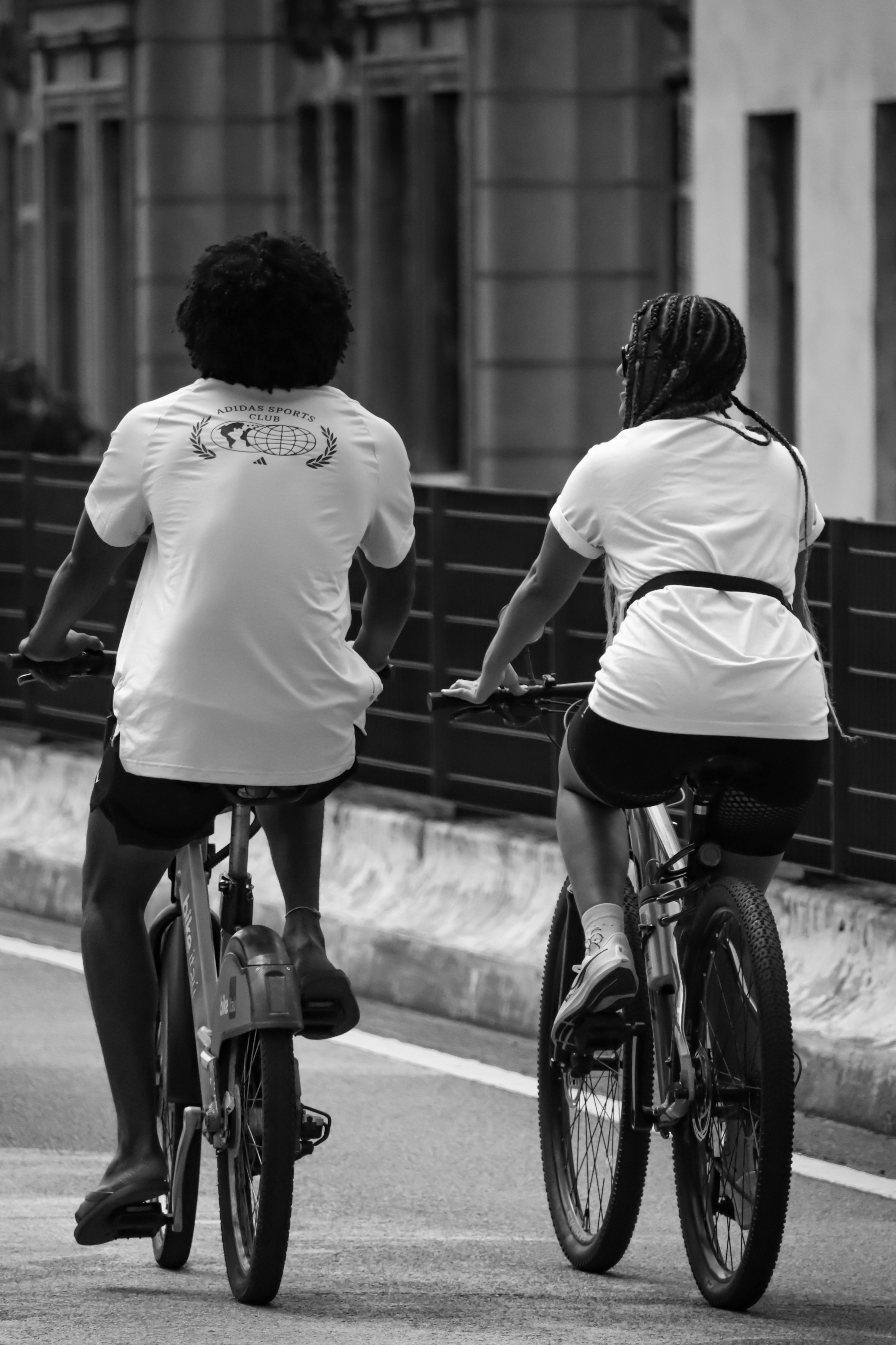Two People Riding Bicycles Side by Side · Free Stock Photo