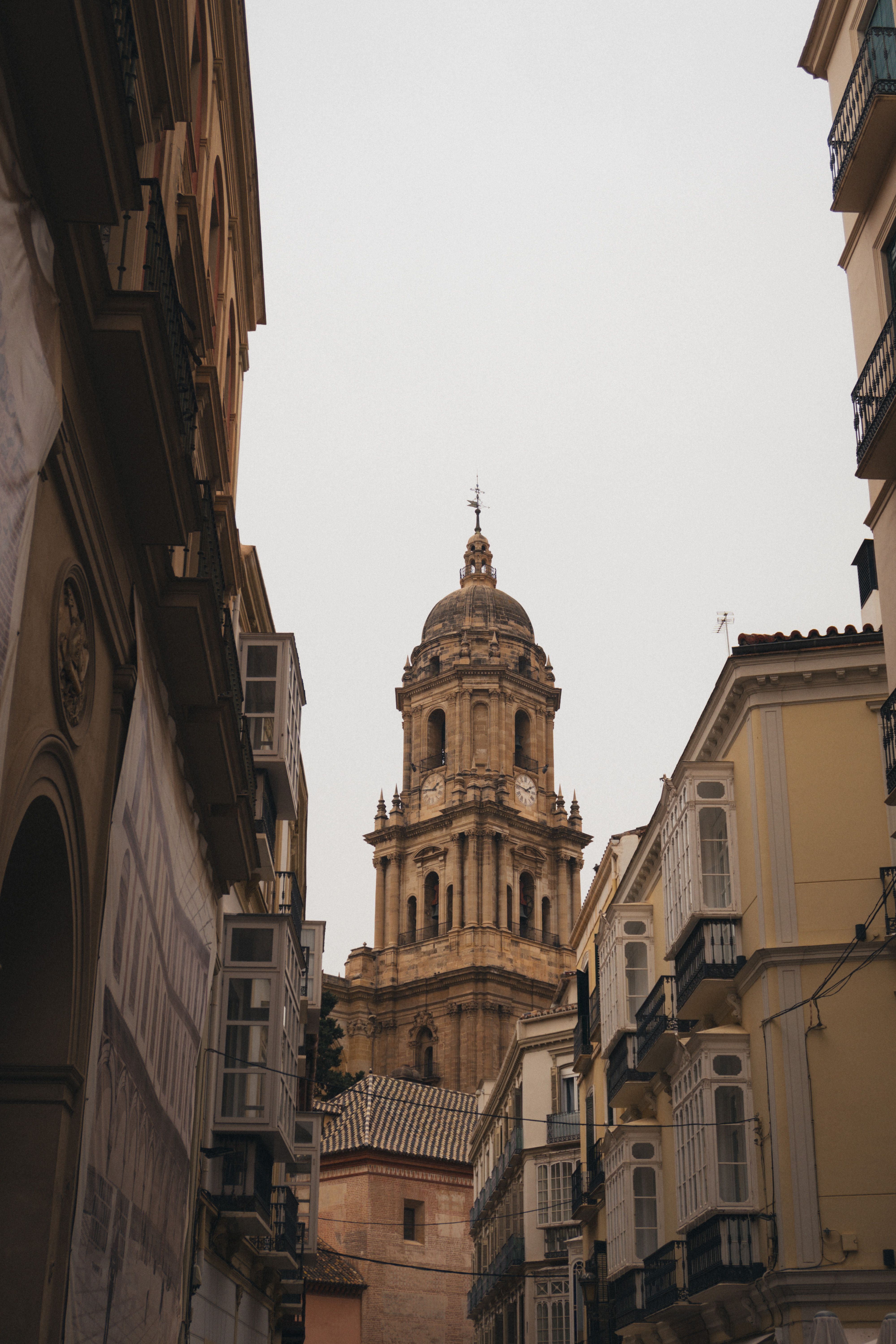 Old Town Buildings and the Cathedral Tower in Malaga, Spain · Free ...