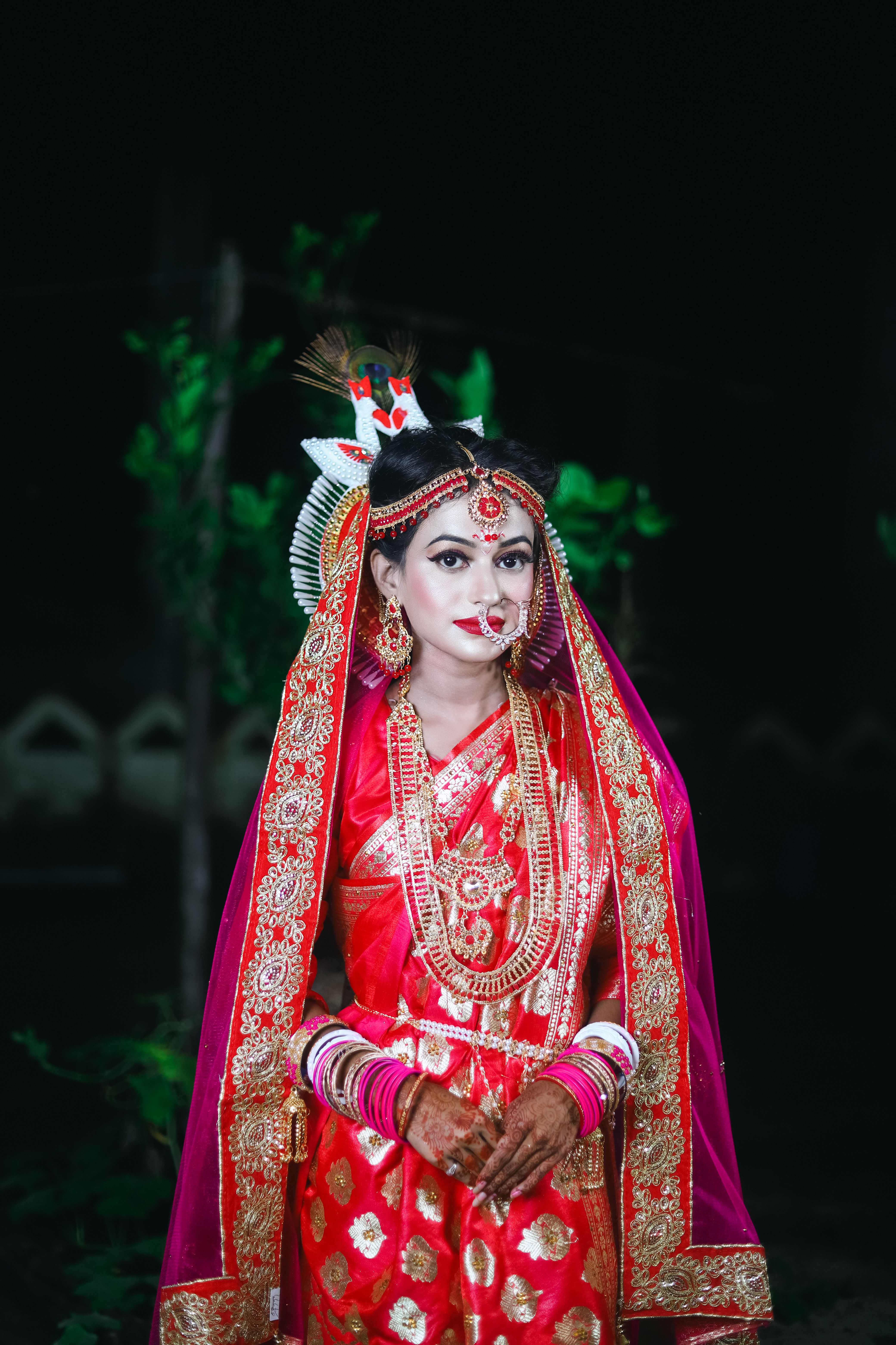 Bride in Traditional Dress and Veil · Free Stock Photo