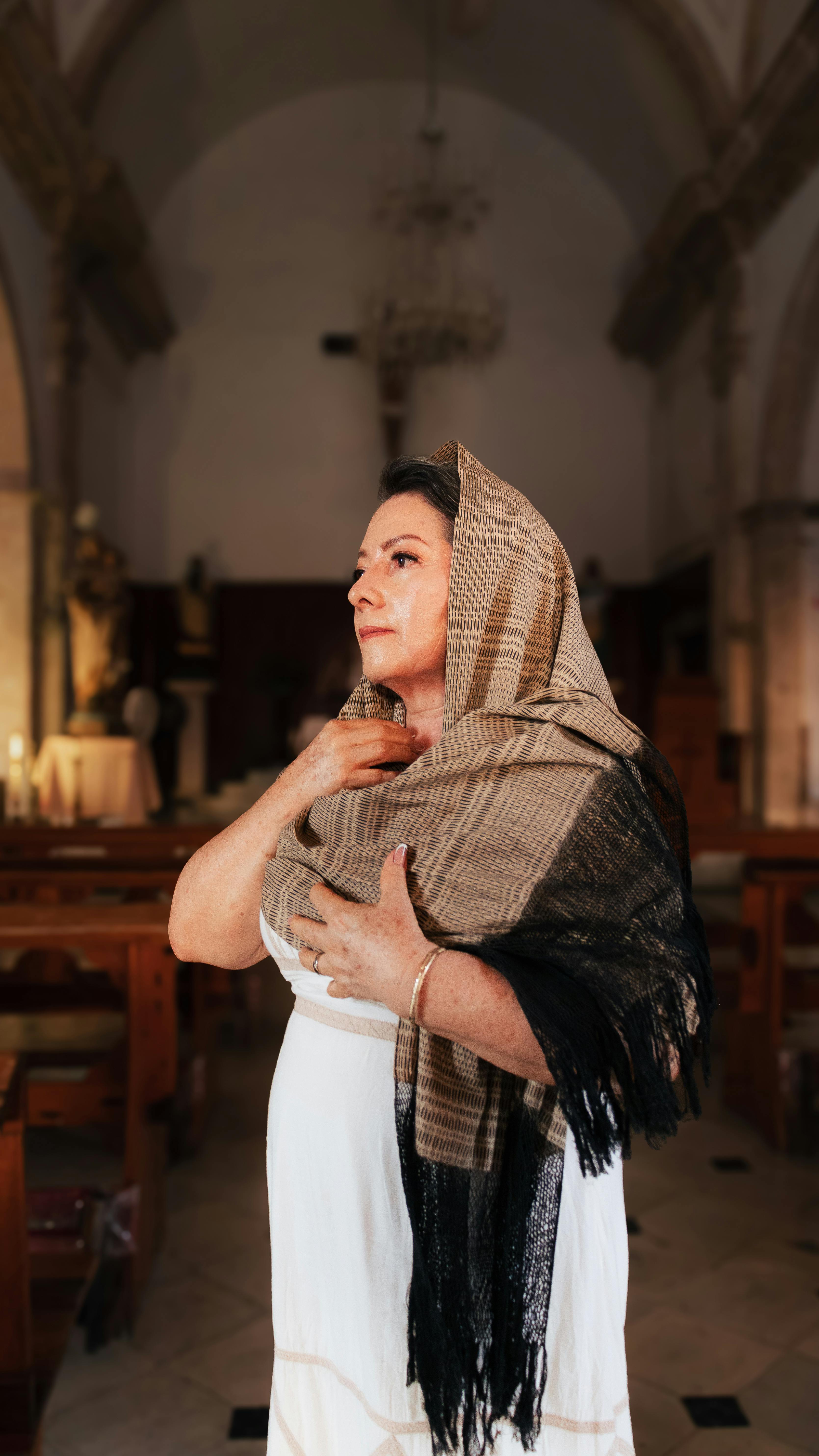 Woman Wearing a Headscarf in a Church · Free Stock Photo