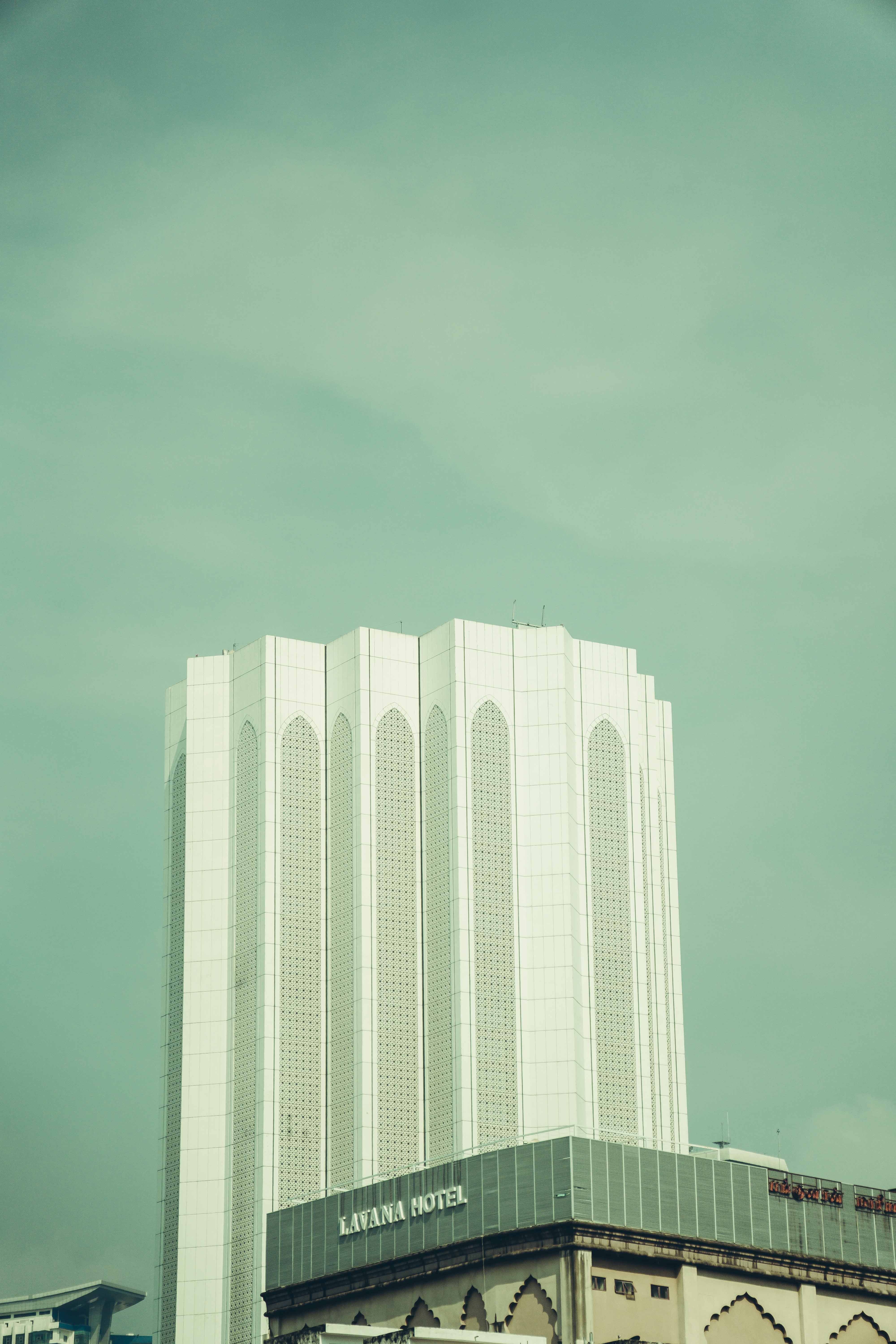 White Skyscraper in Sunlight · Free Stock Photo