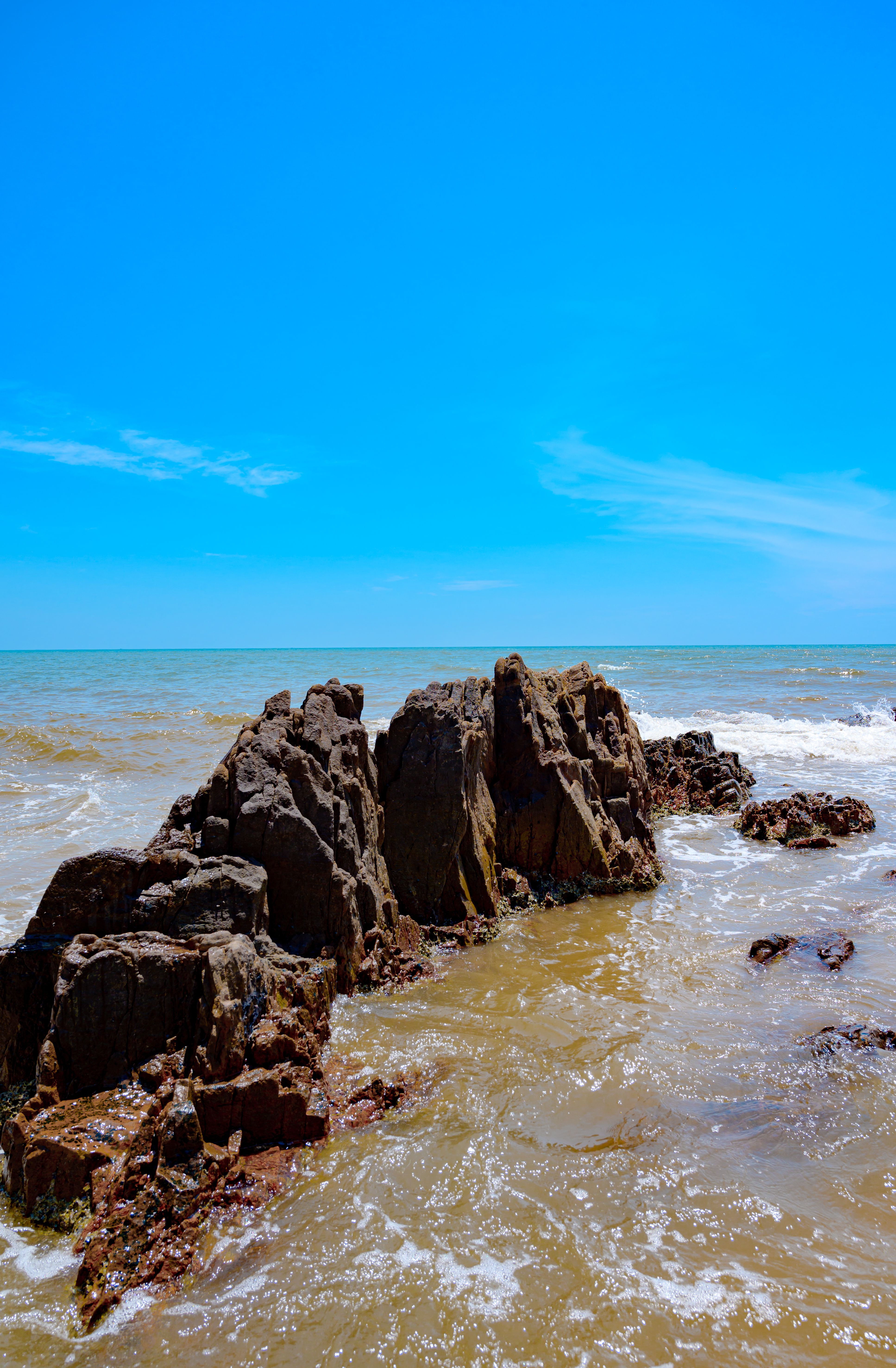Rocks in Water on a Beach · Free Stock Photo