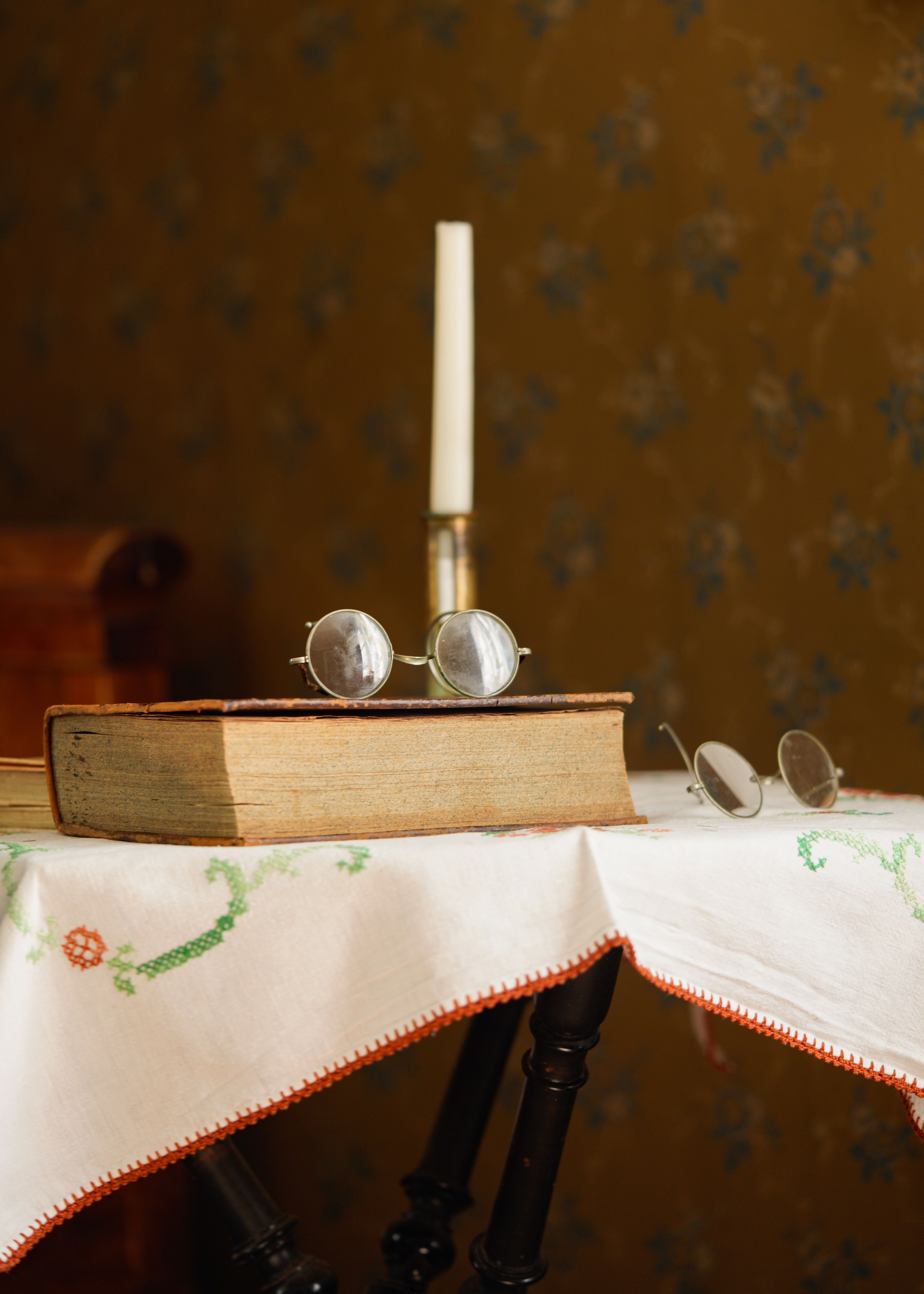 Vintage Book and Eyeglasses on Table · Free Stock Photo