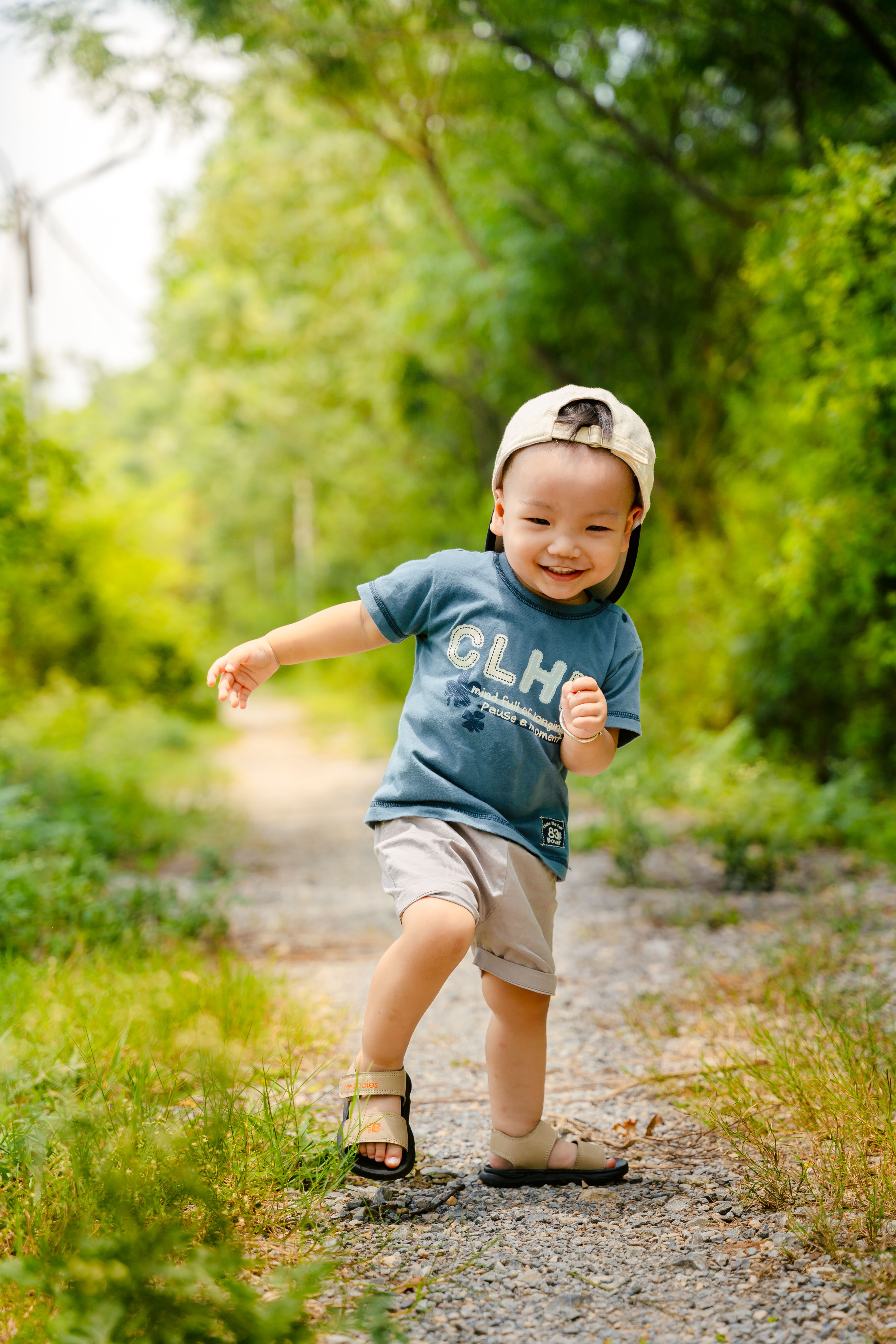 Smiling Kid on a Path in the Countryside · Free Stock Photo
