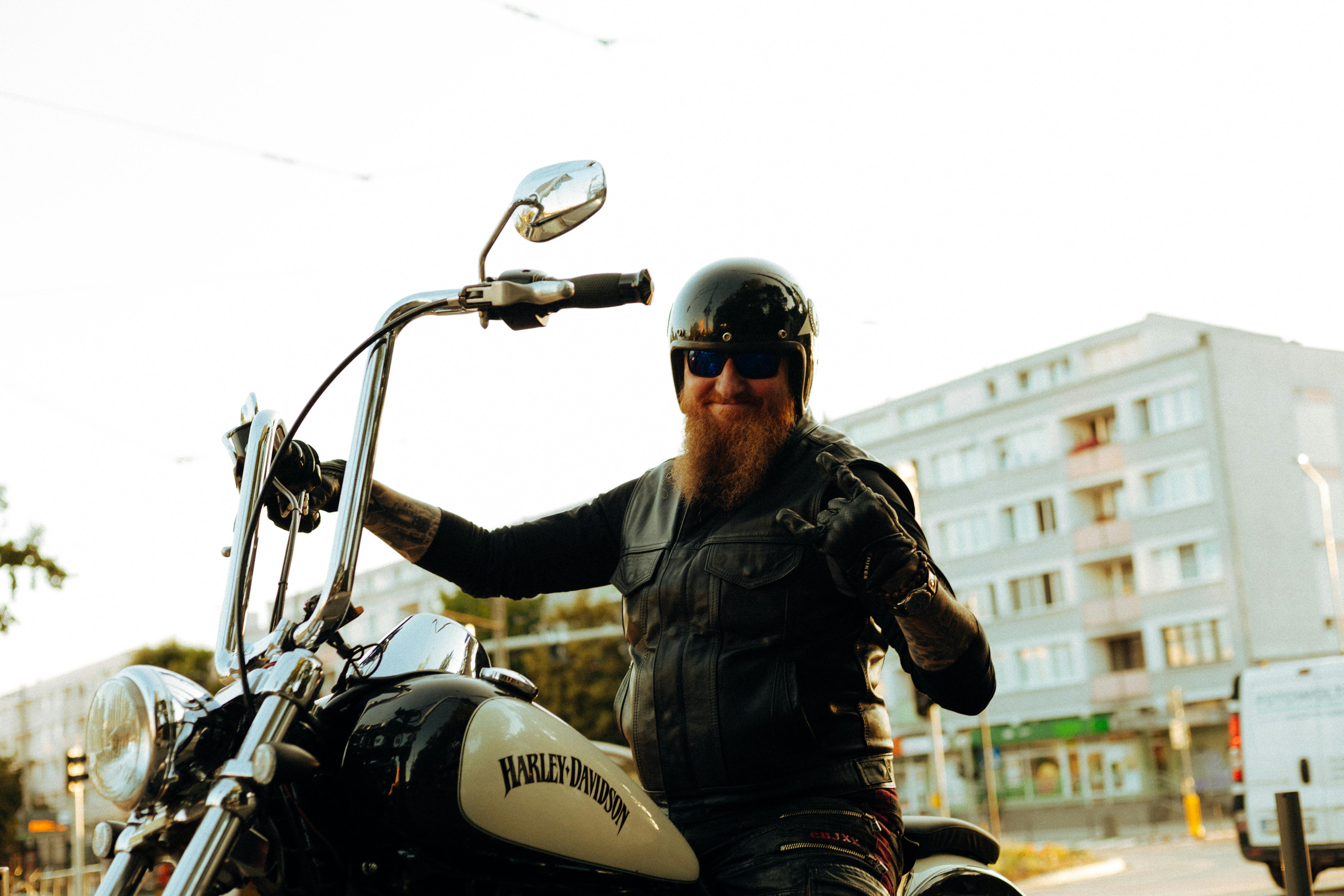 Man Riding on Black Motorcycle · Free Stock Photo