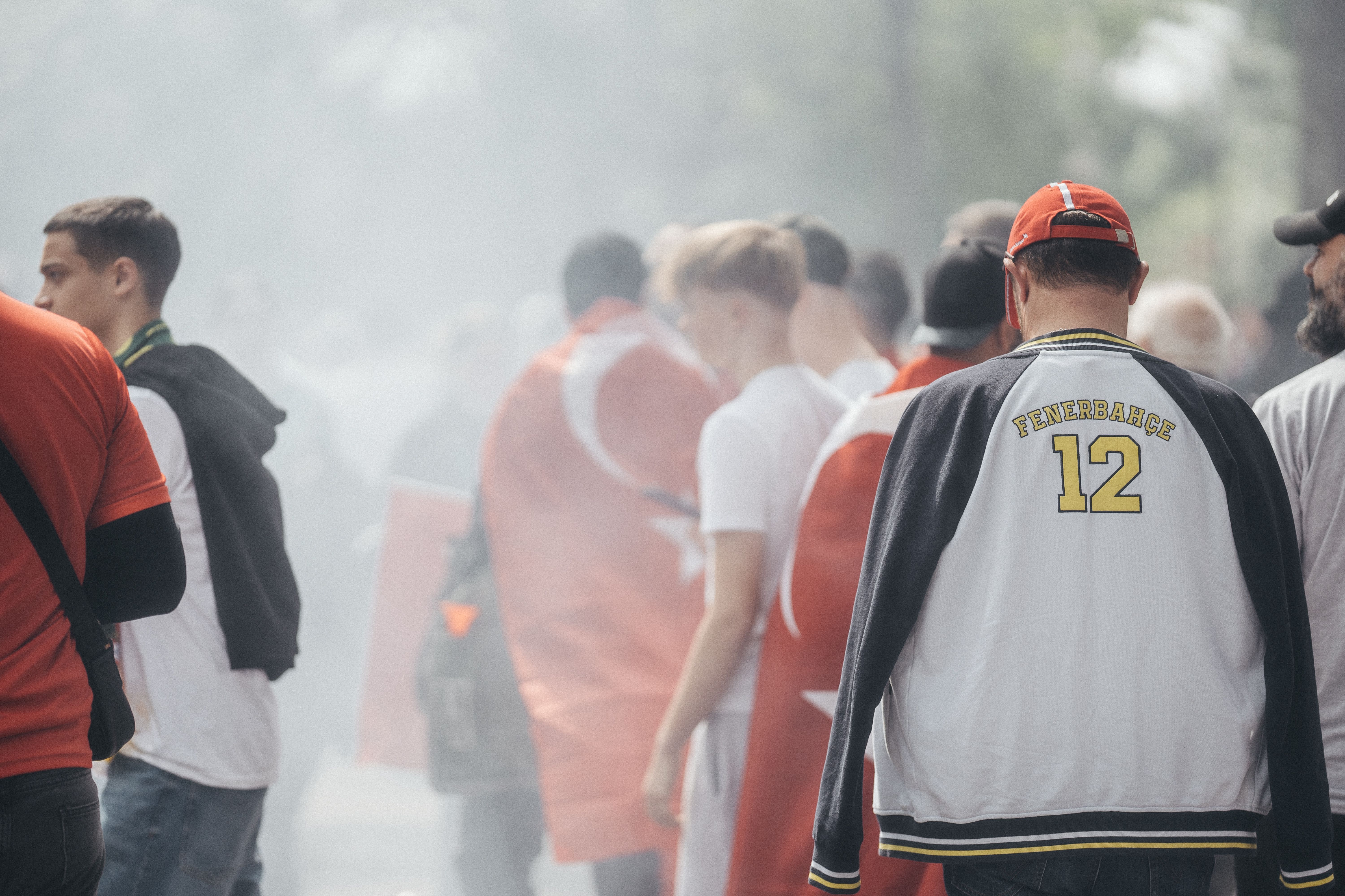 Sports Fans with Turkish Flags Amidst the Smoke · Free Stock Photo
