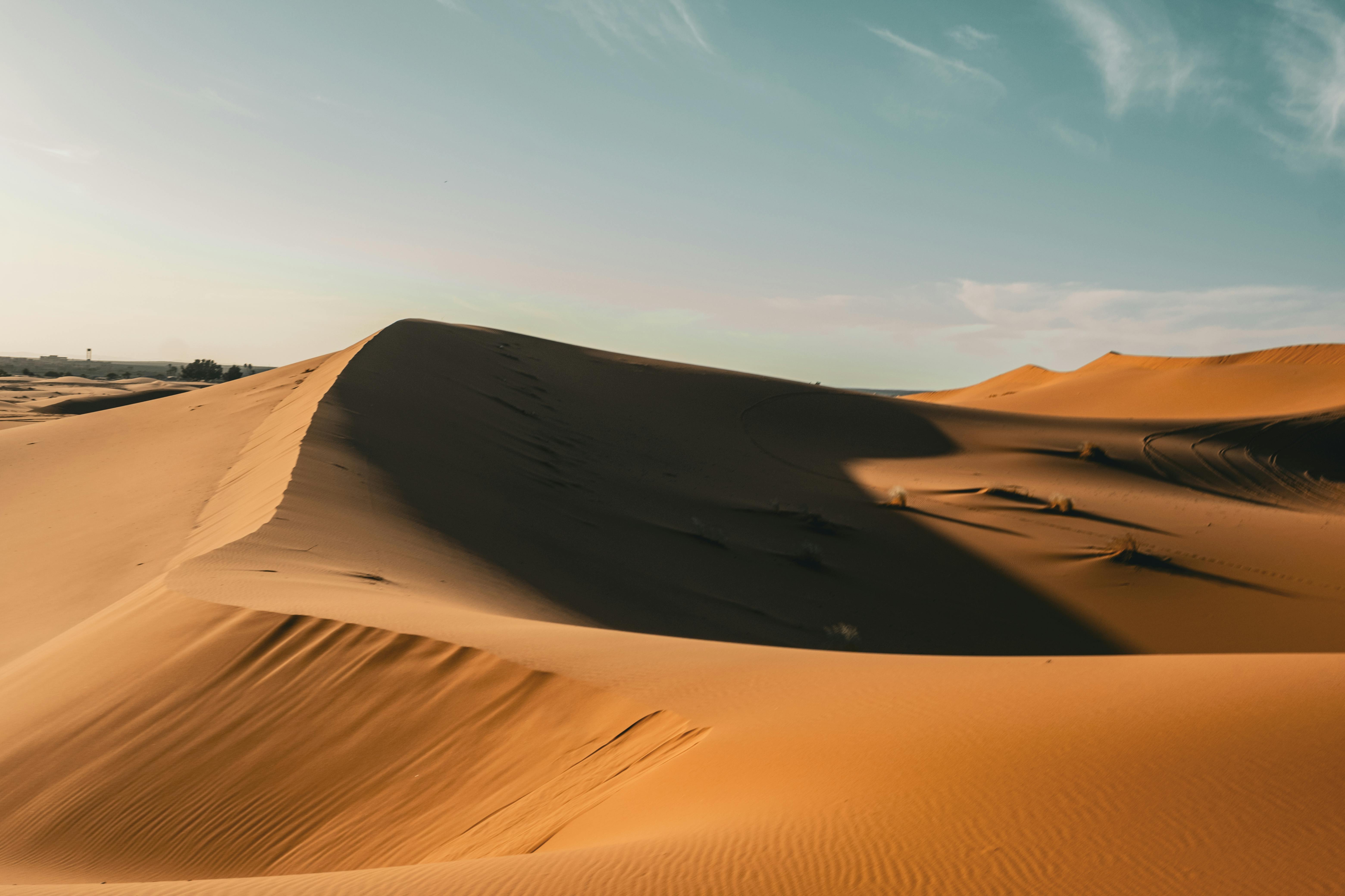Desert Sand Under Clear Sky · Free Stock Photo